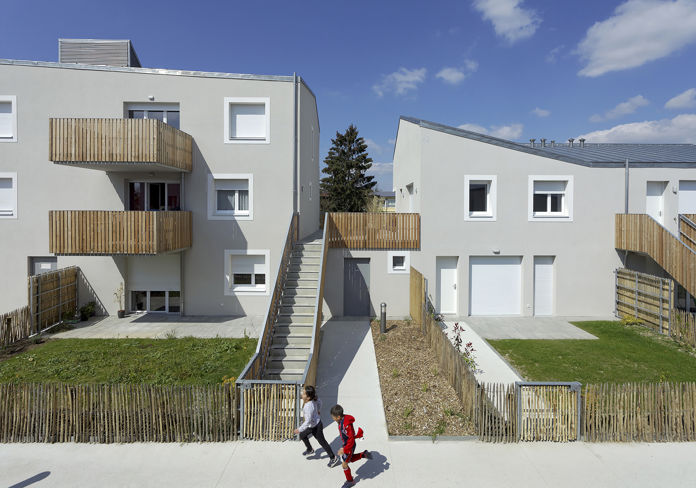Gallery of 31 Housing Units in Ecquevilly / Benjamin Fleury Architecte ...