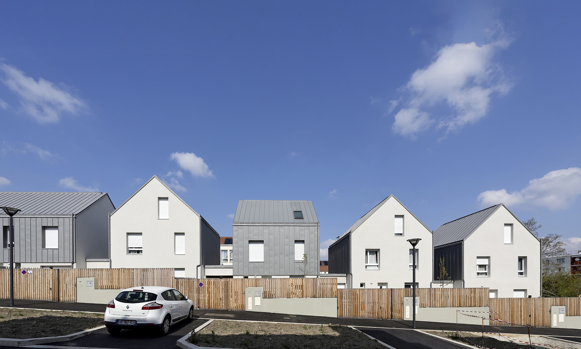 Gallery of 31 Housing Units in Ecquevilly / Benjamin Fleury Architecte ...