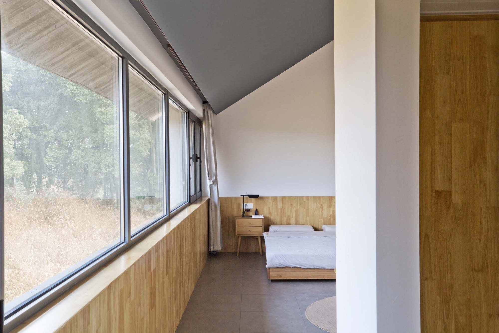 Gallery of Tang House / Atelier ZAI - 21