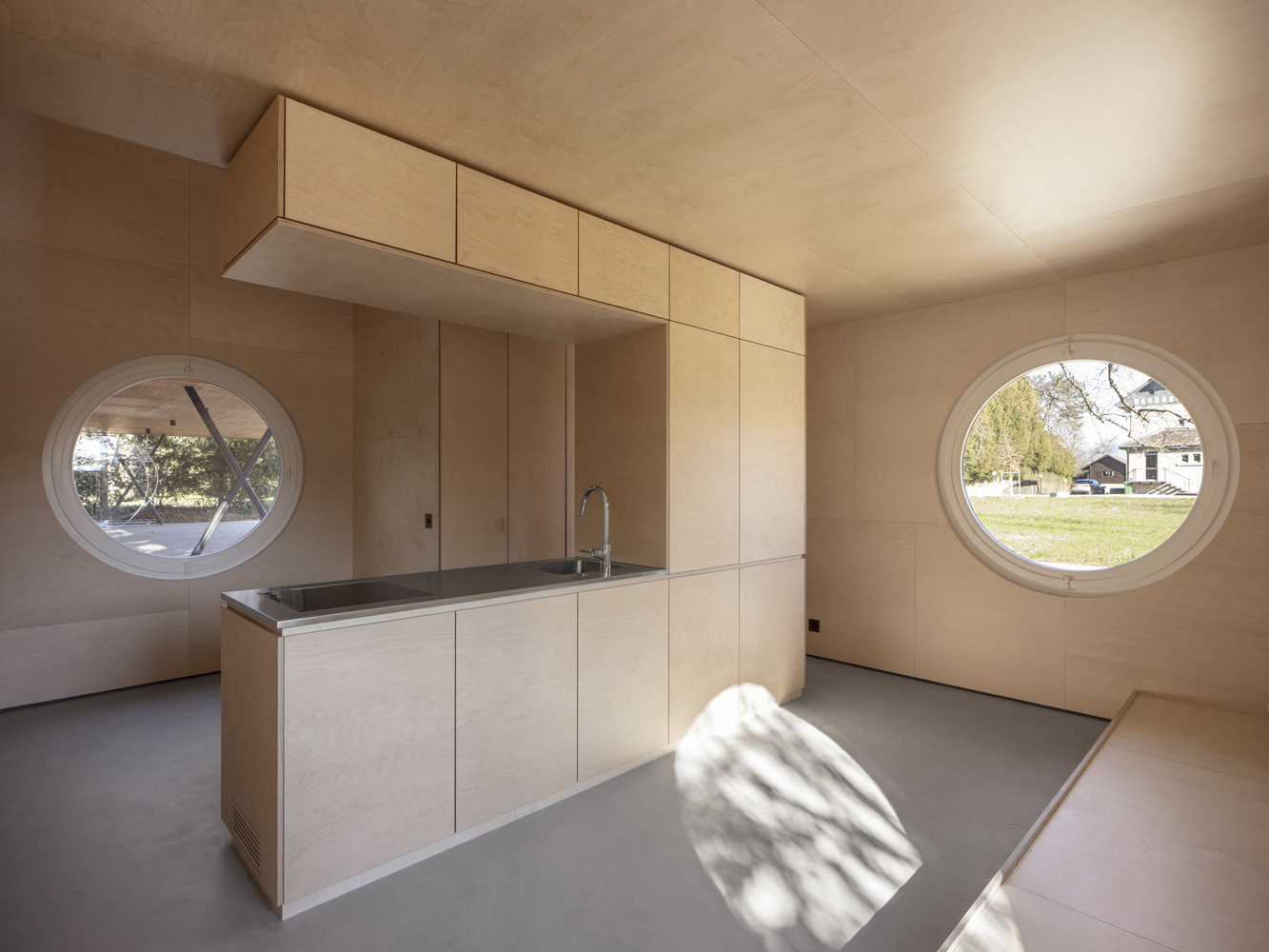 Gallery of Circular Openings: From Boats to Contemporary Architecture - 9