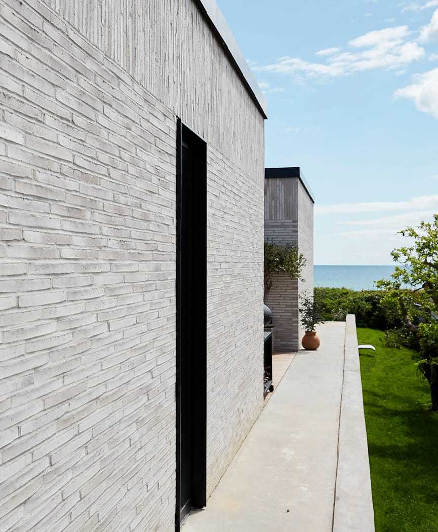 Gallery of The Versatility and Structural Integrity of Extra-Long Brick ...