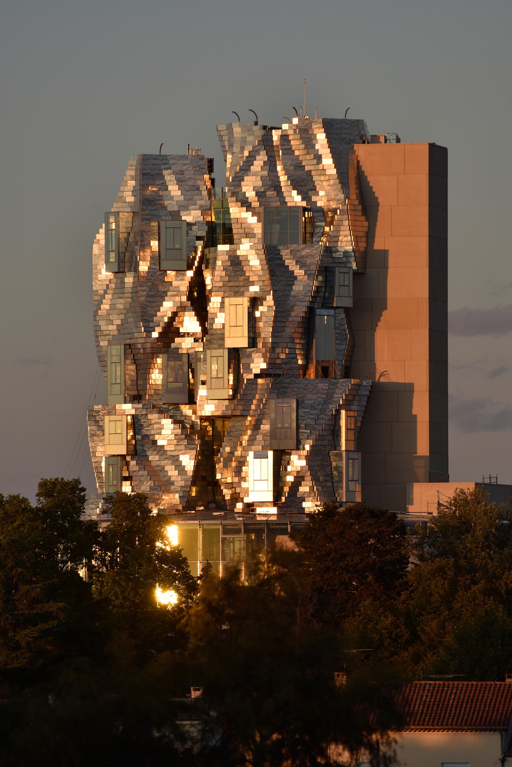 Gallery of Frank Gehry's Dynamic Reflective Tower Opens to the Public ...