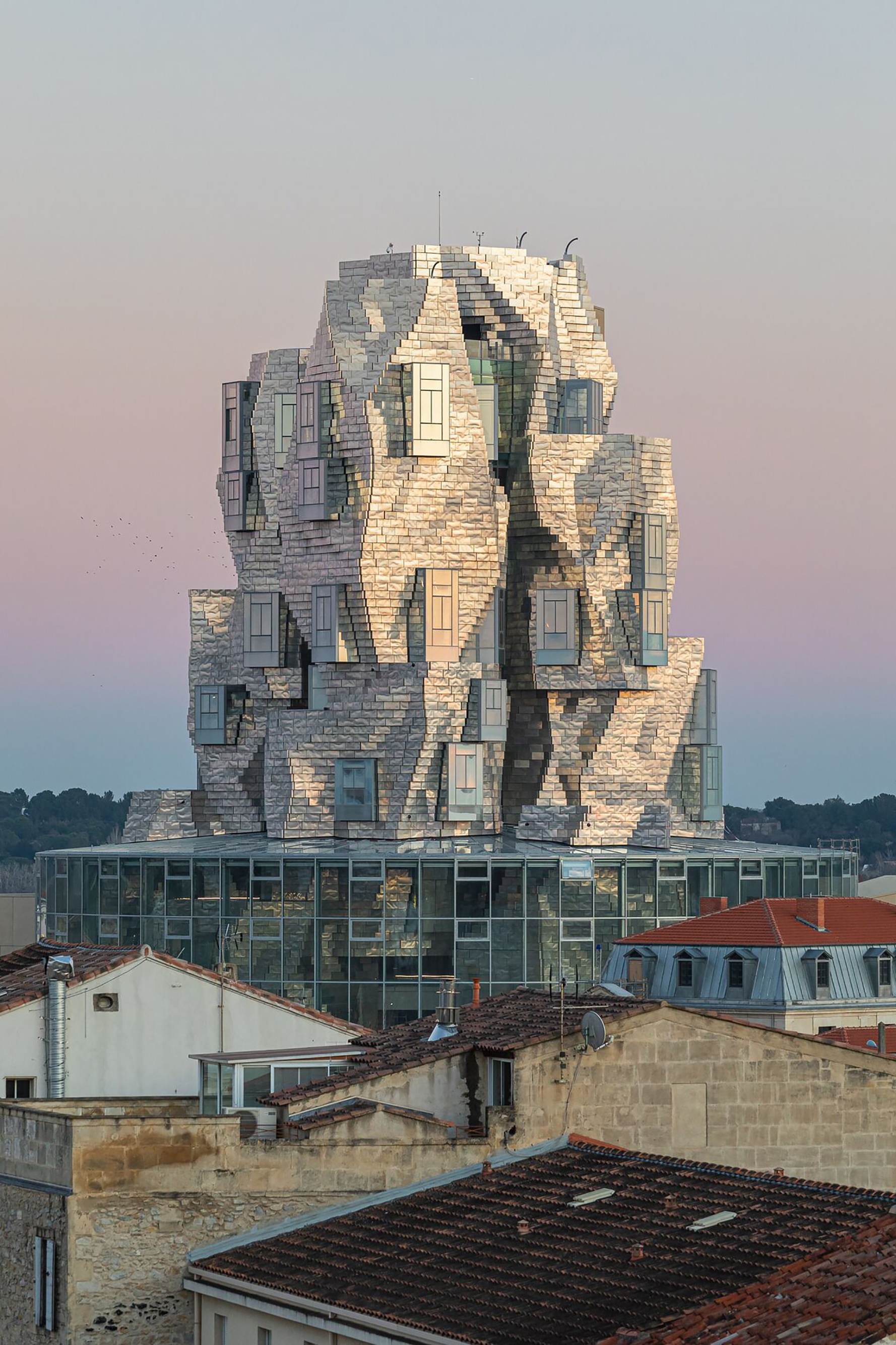 Gallery of Frank Gehry's Dynamic Reflective Tower Opens to the Public ...