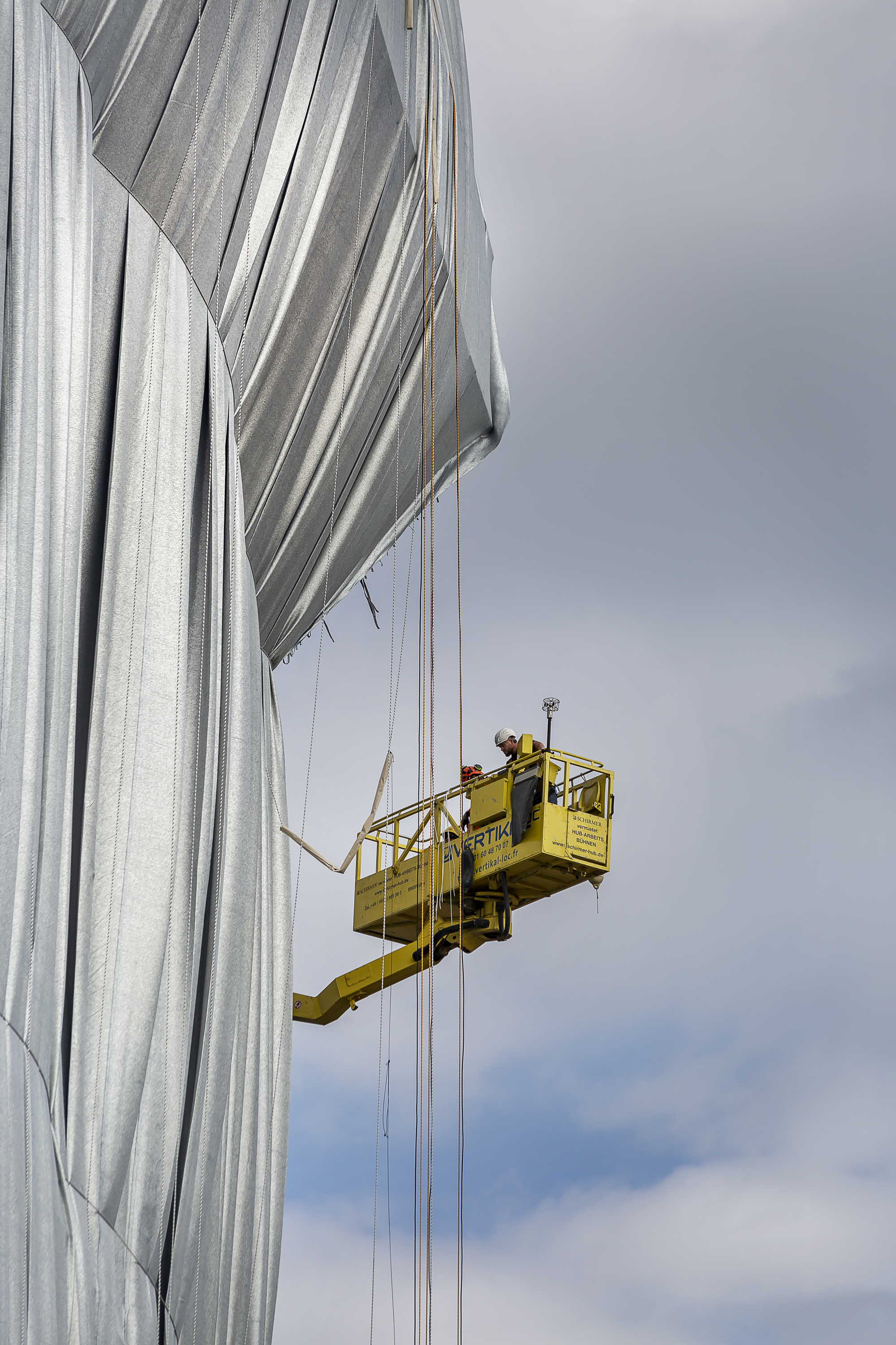 Gallery of First Images Reveal Christo's Wrapped Arc de Triomphe in ...