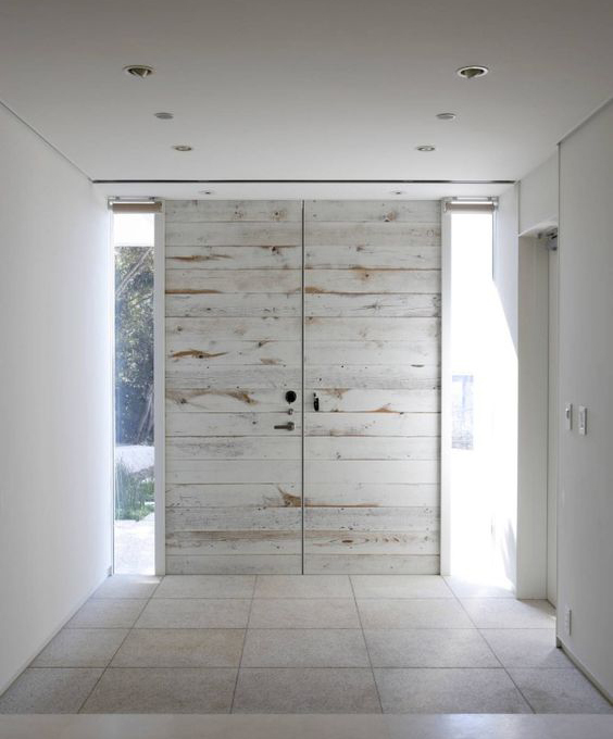 Galeria de Como escolher a porta de entrada de uma casa? - 21