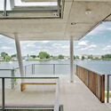 Footbridge on the water Residential Building / LOVE architecture and ...