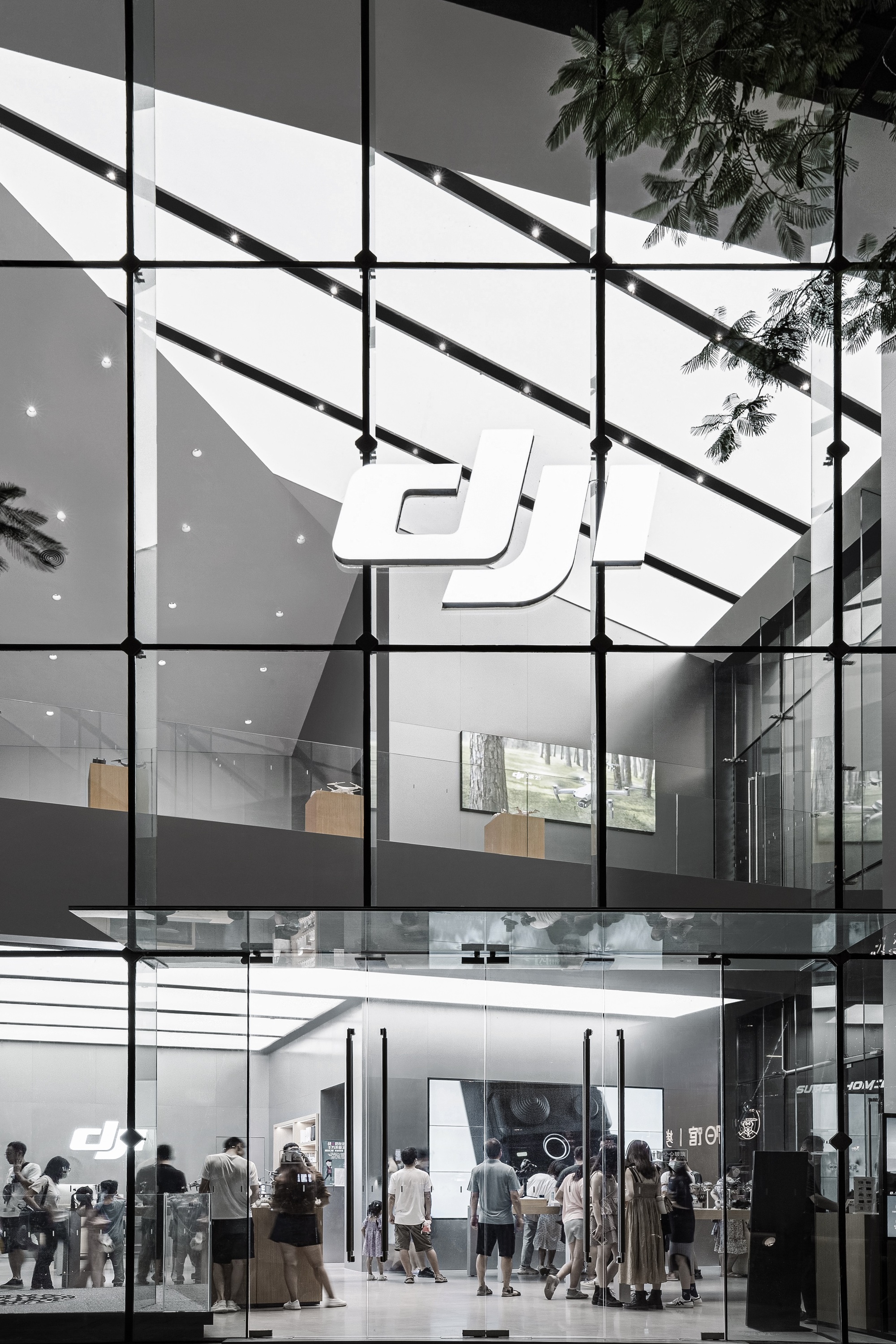 Gallery of DJI Retail Store / E Studio - 8