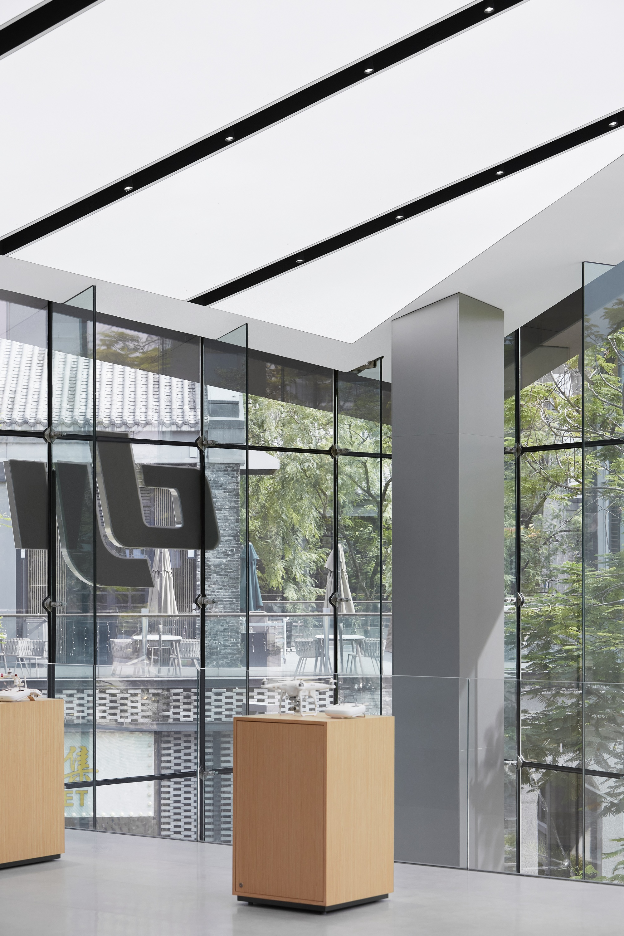 Gallery of DJI Retail Store / E Studio - 2