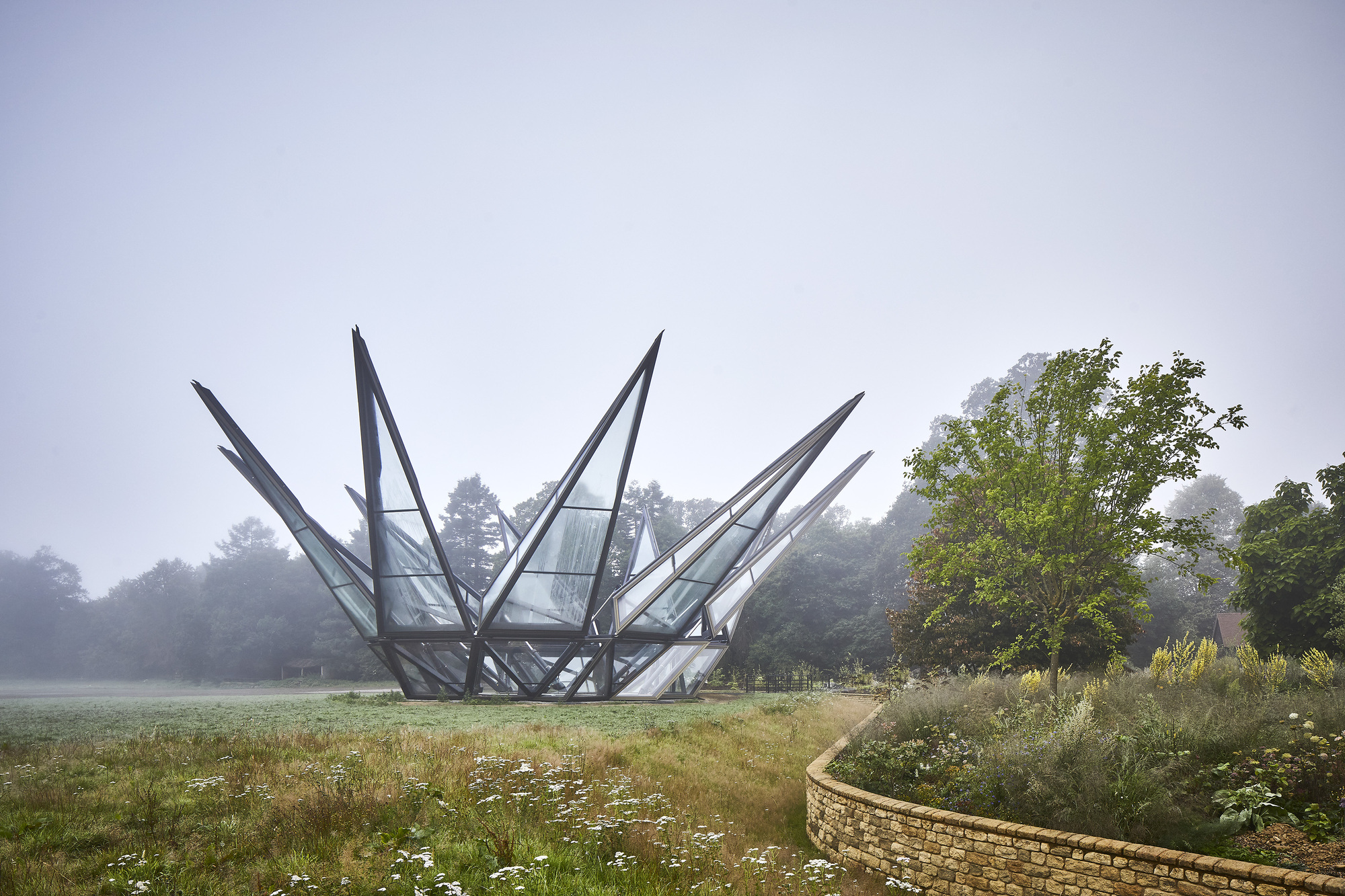 Heatherwick Studio Unveils Crown-Shaped Kinetic Glasshouse in West ...