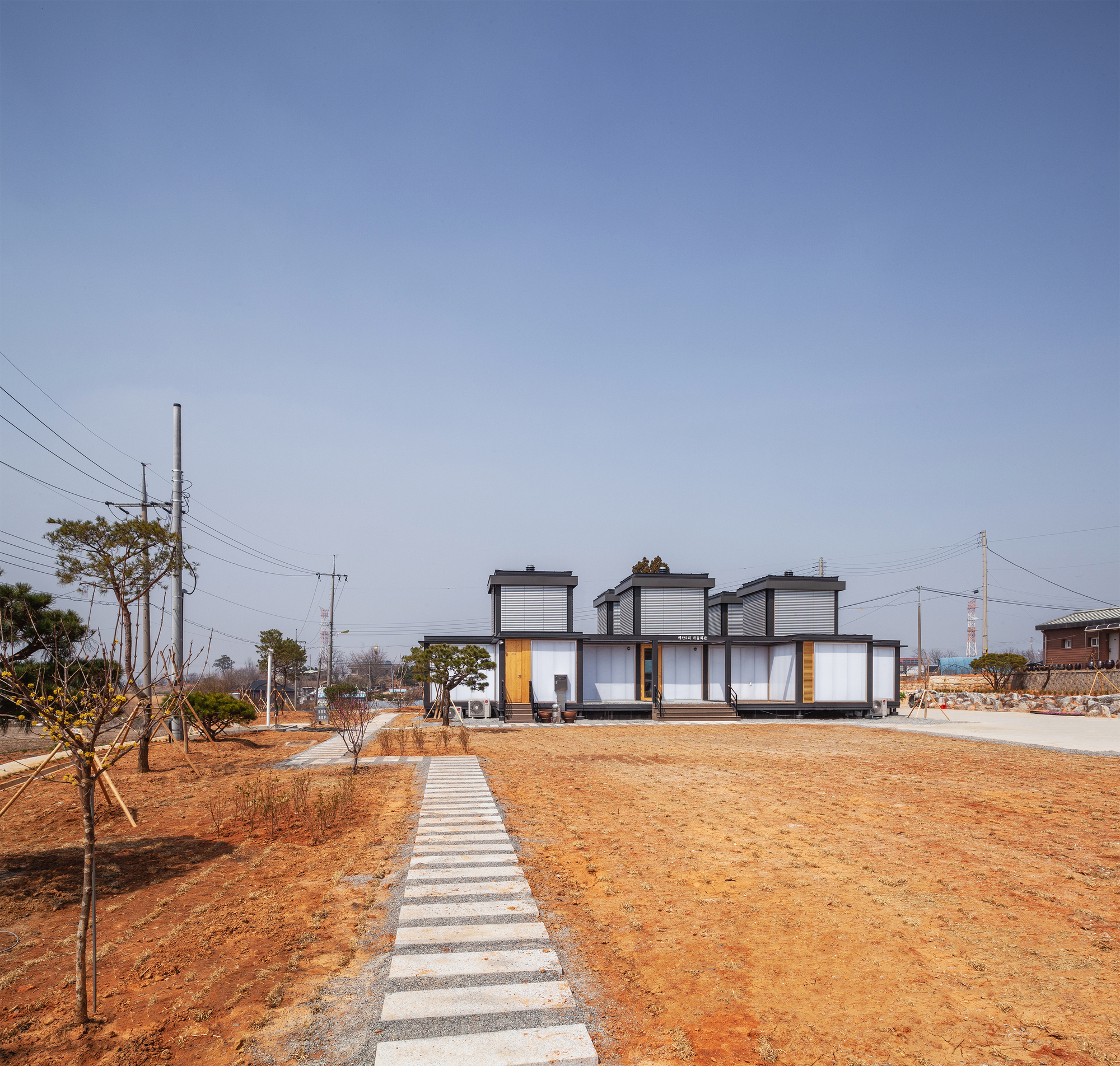 Gallery of MAE-AN-GEO Village Community Center / studio zozo - 12