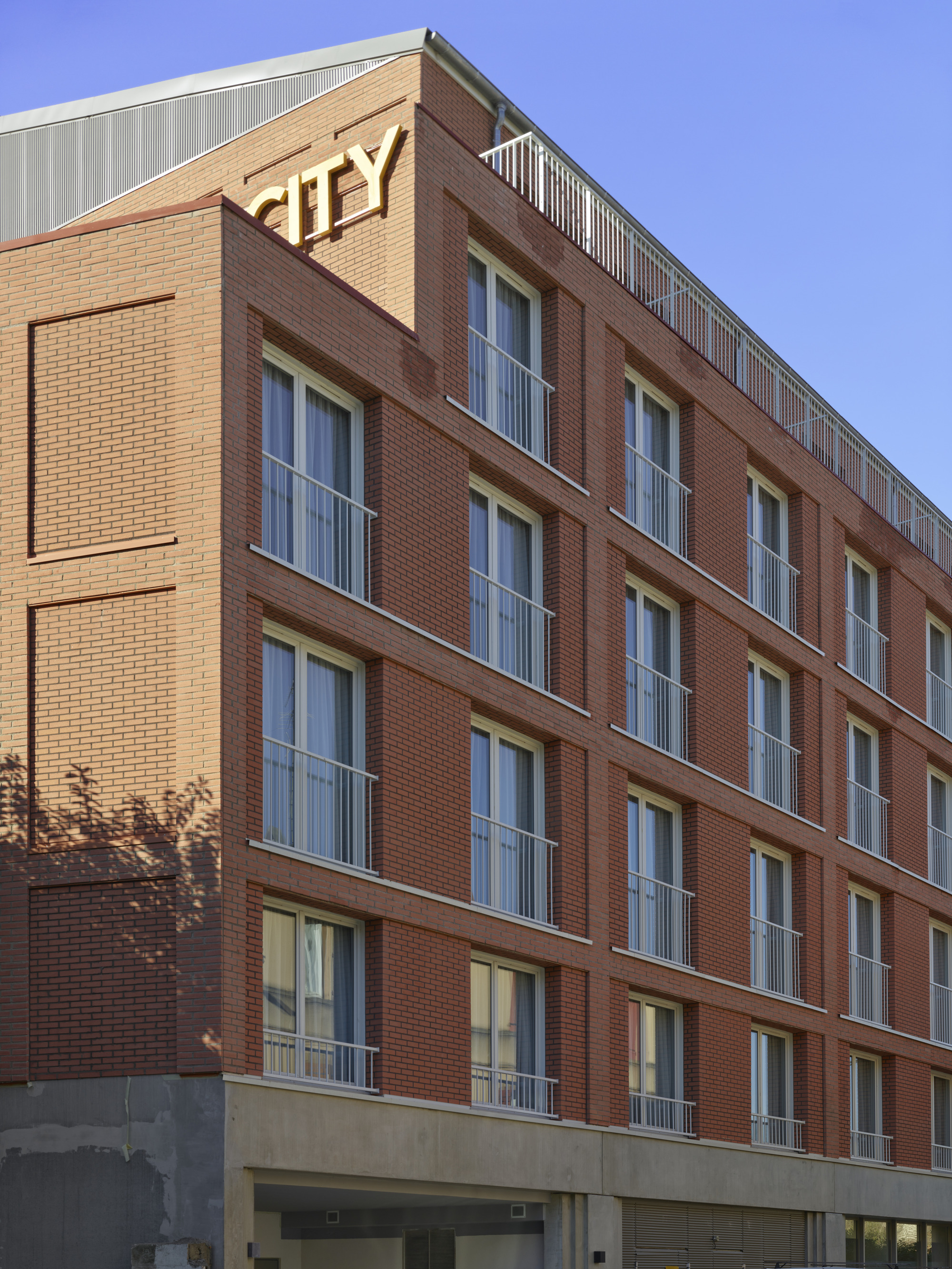 Gallery of En Aparté Hotel & Apartments / Taillandier Architectes ...