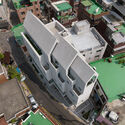 T Roof Commercial and Residential Building / SOSU Architects | ArchDaily