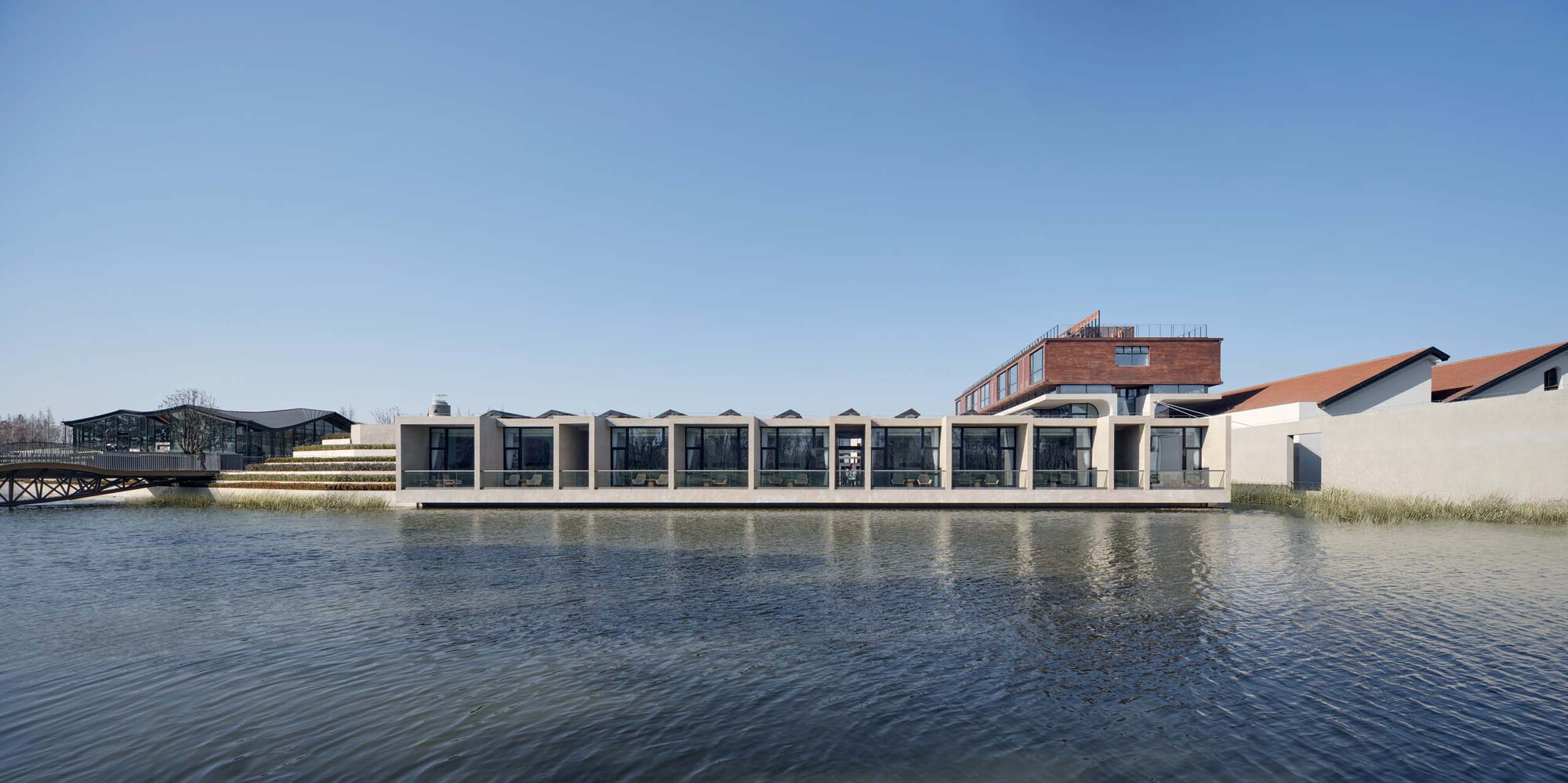 Gallery of The Transformation of the Former Qianshao Weaving Factory ...