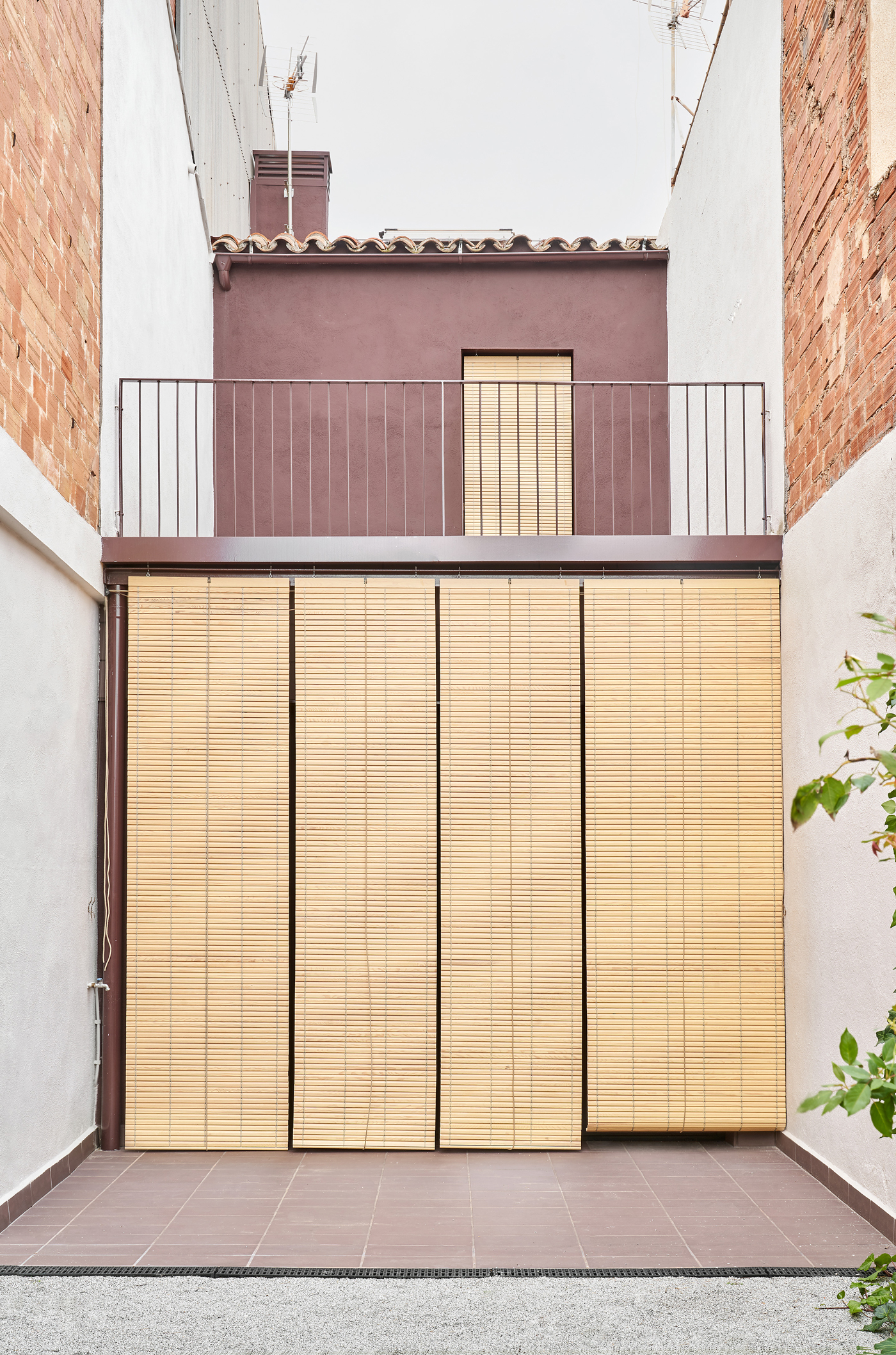 Gallery of 82SAN Restoration and Extension of a House Between Dividing ...