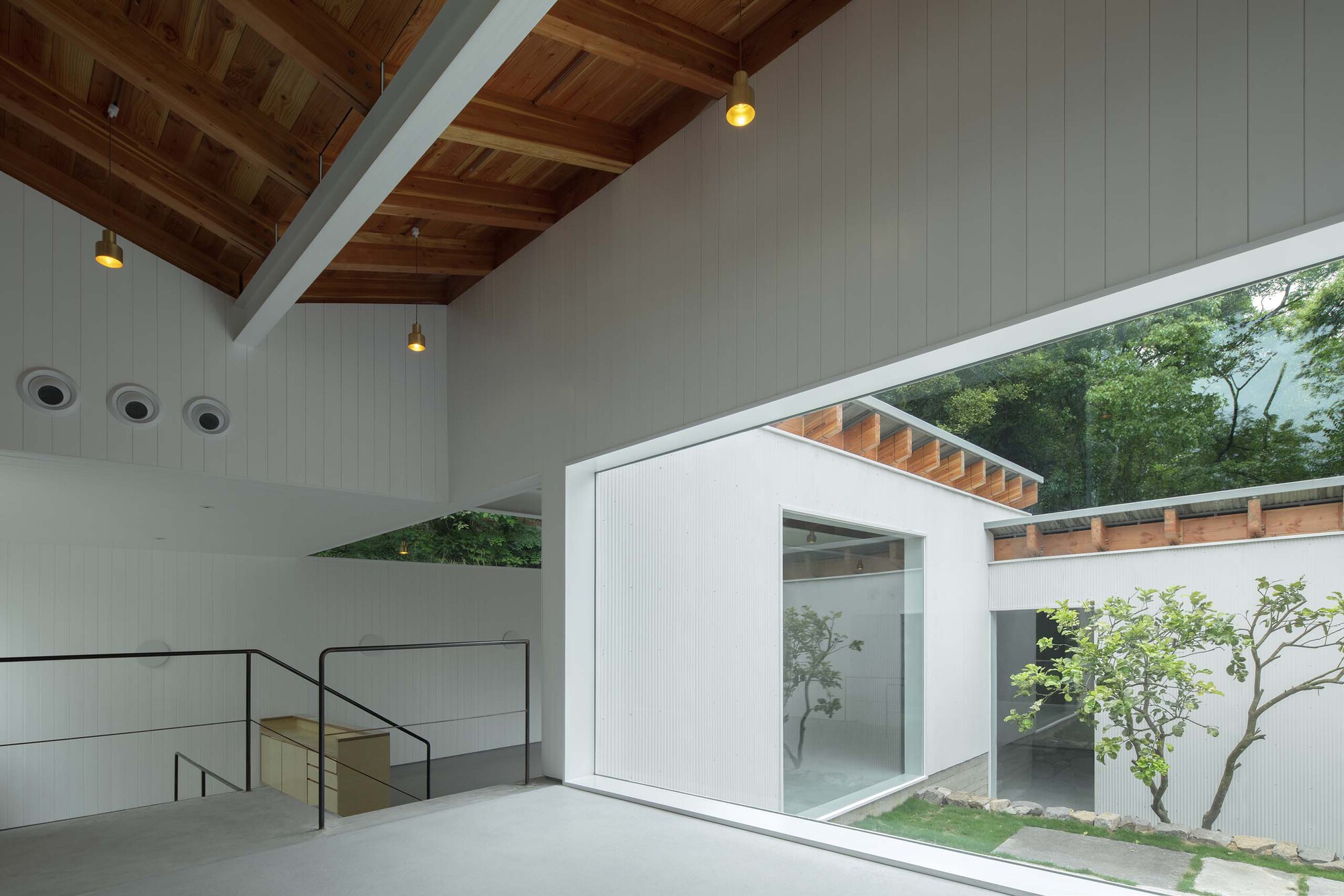 Gallery of Reception on Three Terraces Hostel / Continuation Studio - 25