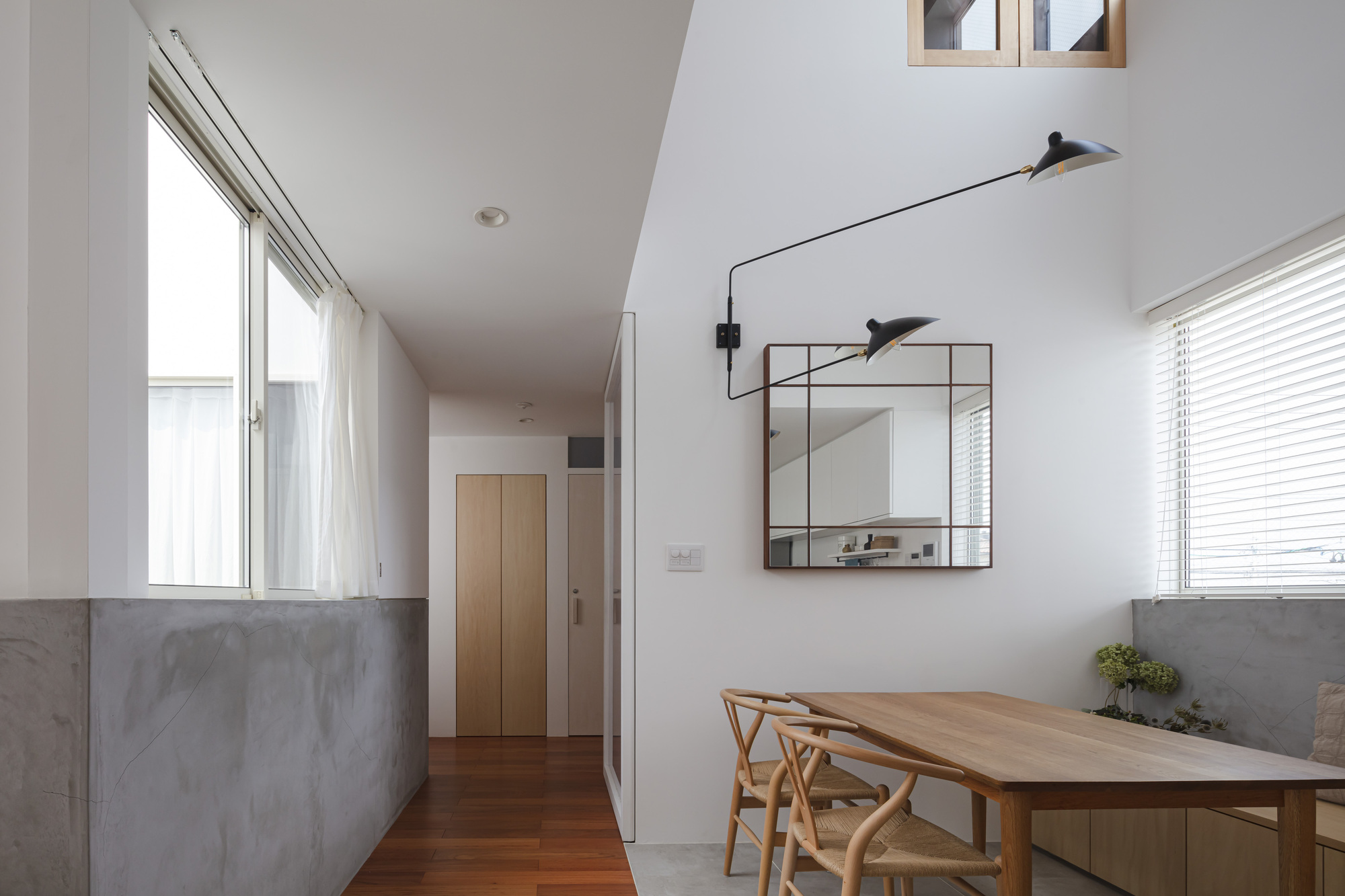 Gallery of House with Hooked Multi Level Crossing / ihrmk - 17