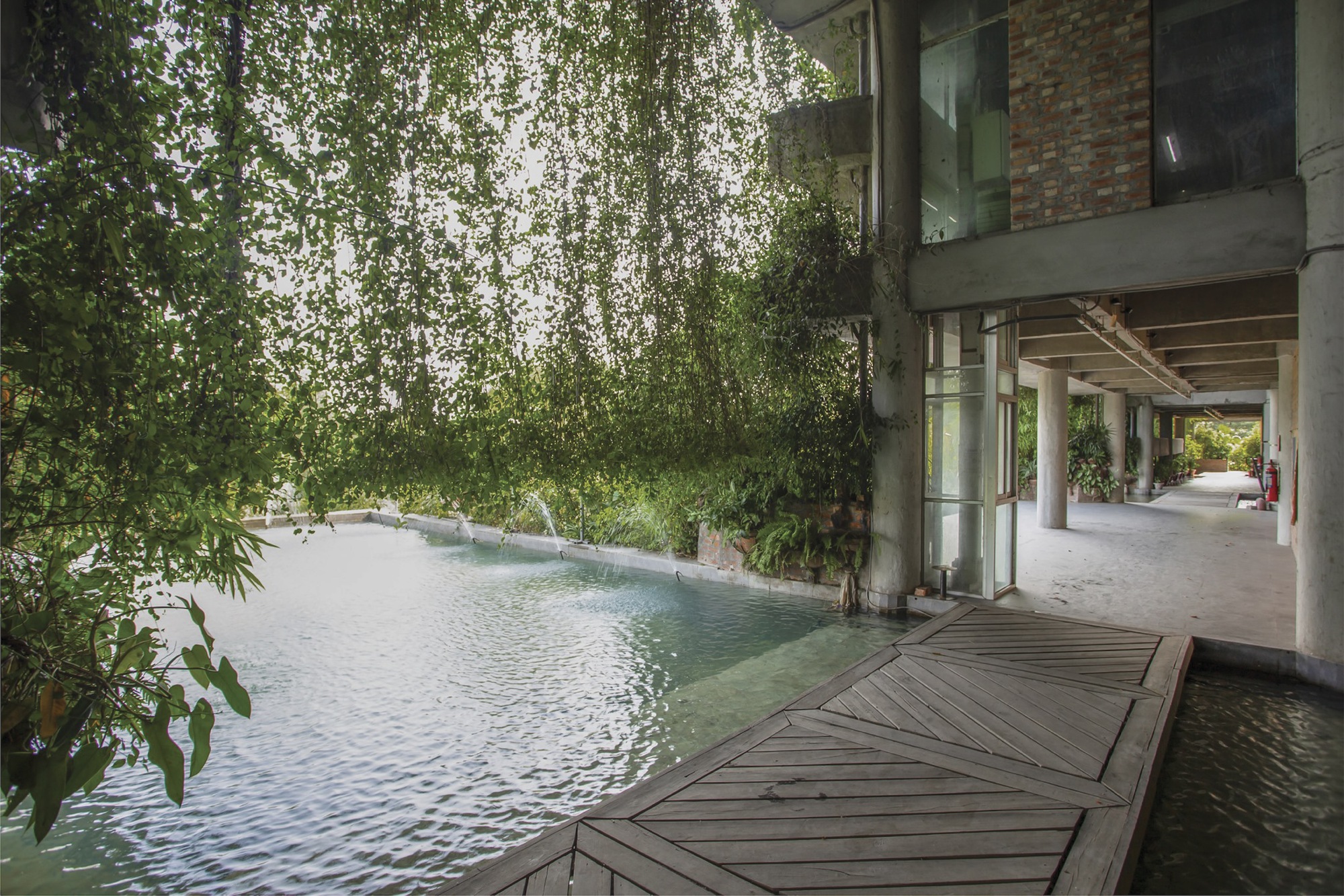 Gallery of Green Field of Karupannya Rangpur Factory / Nakshabid Architects - 13