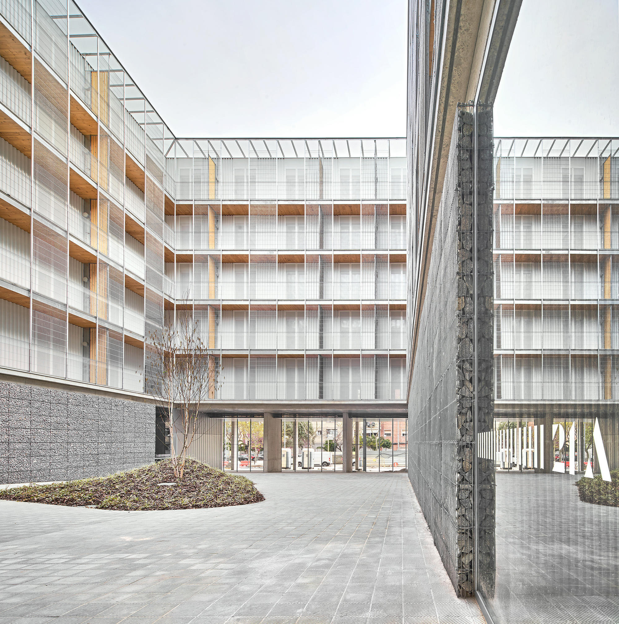Gallery of 4 Social Housing Developments That Wrap Around Central ...