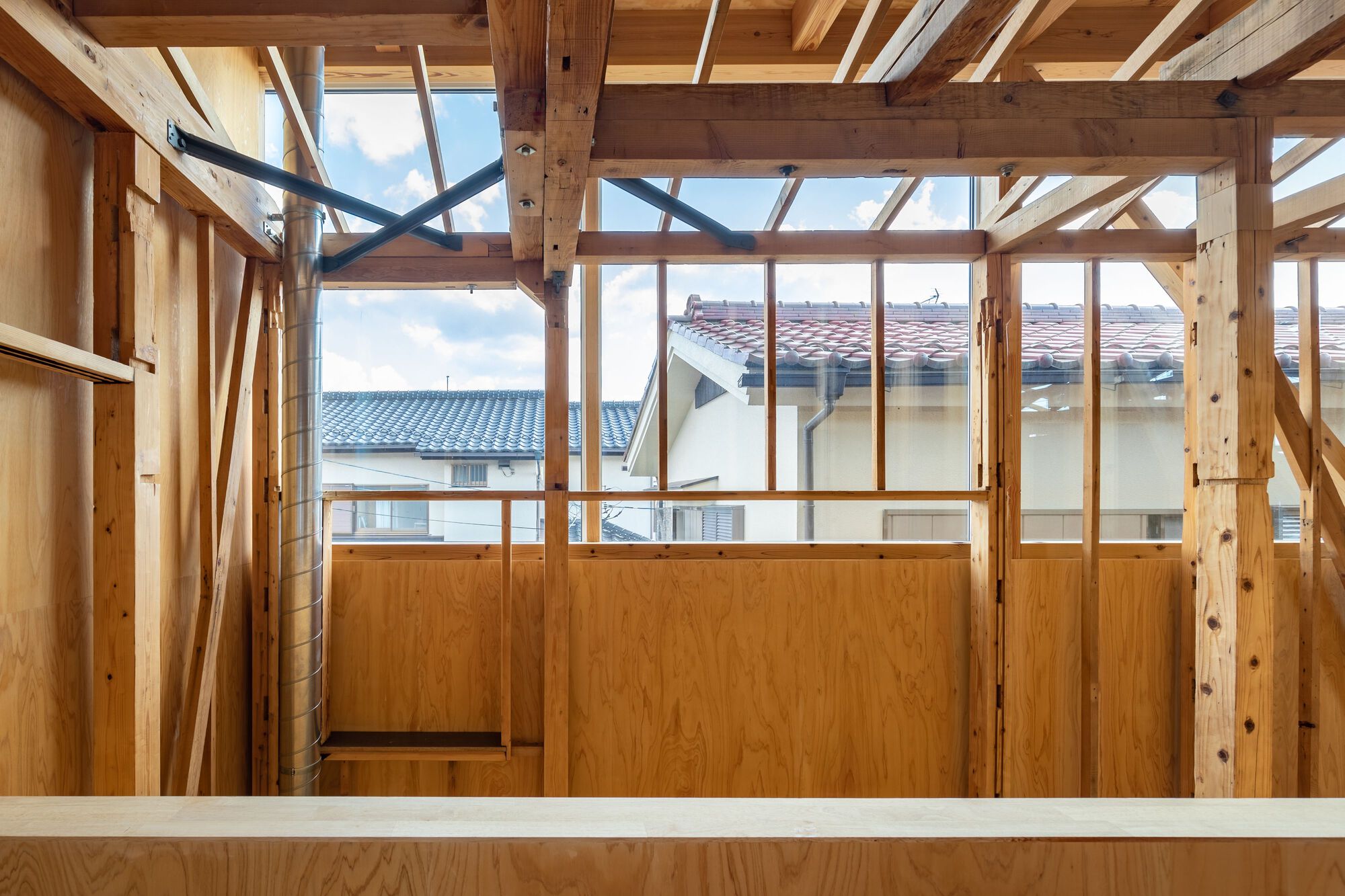 Gallery of Father and Son's House / Unemori Architects - 26