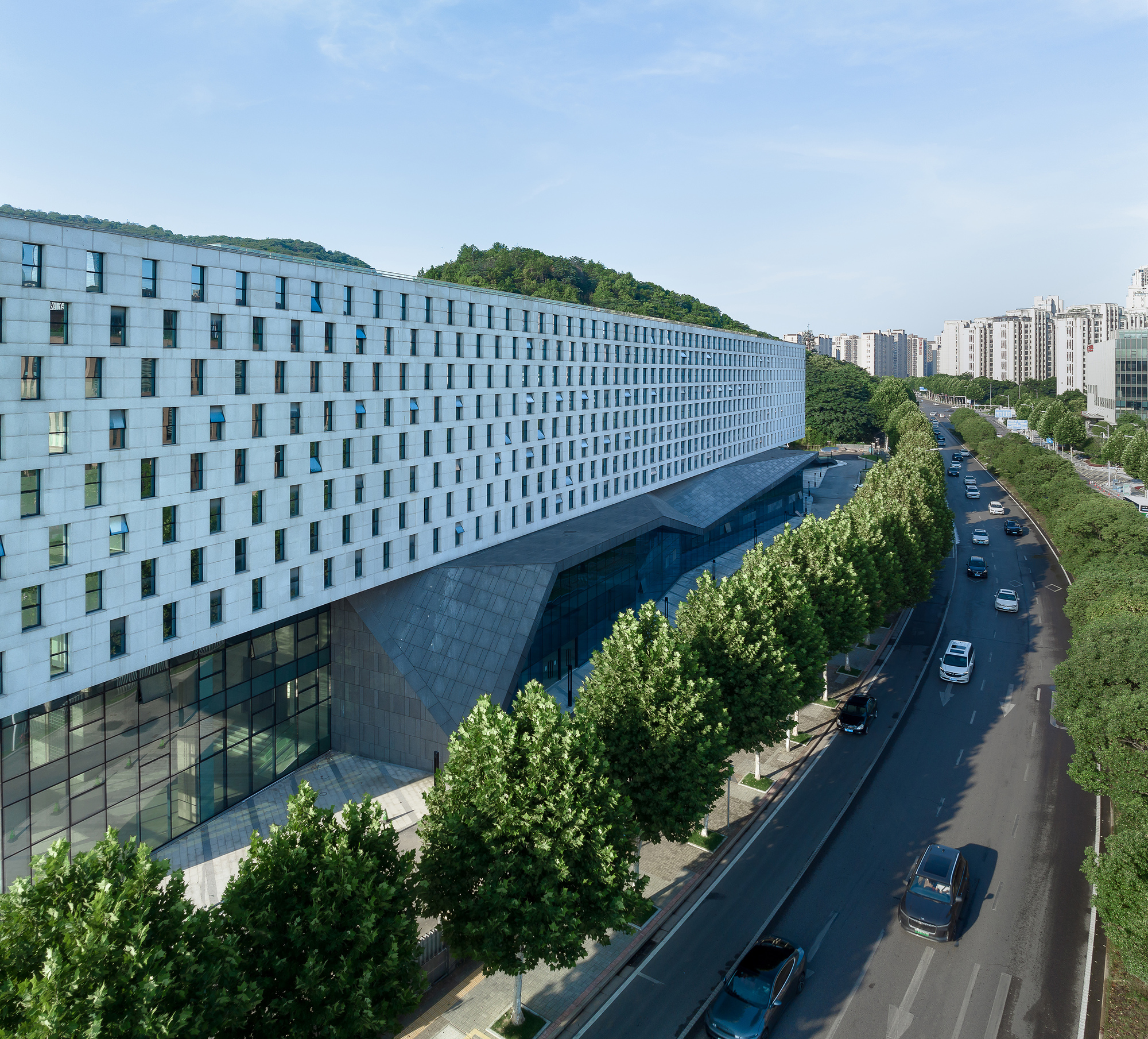 Gallery of JJM Headquarters / UNIT - 21