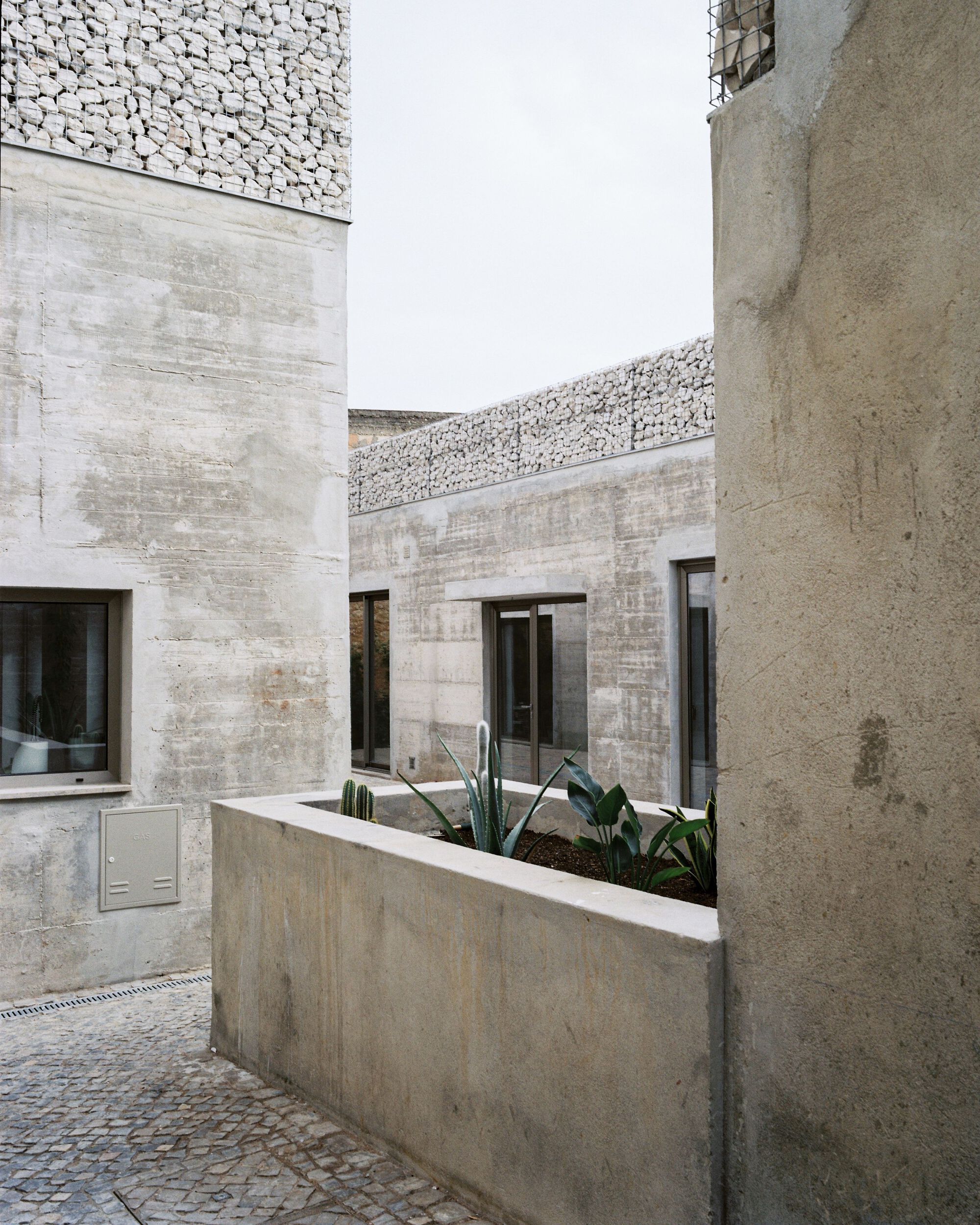 Gallery of Three Exposed Concrete Façades / corpo atelier - 4
