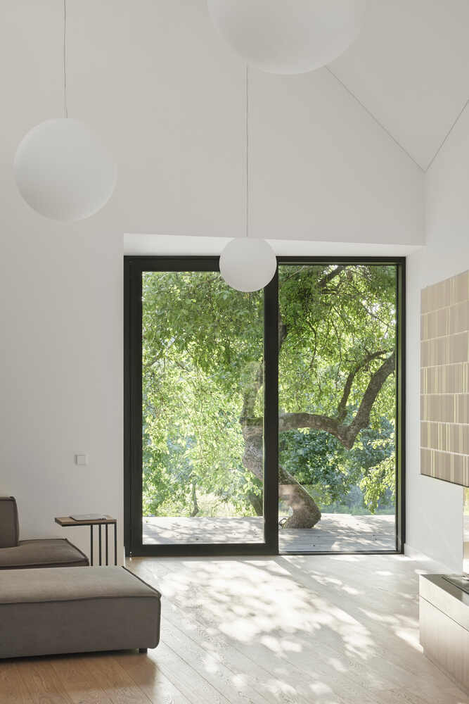 Gallery of Indoor-Outdoor Homes in Lithuania: 20 Projects with ...