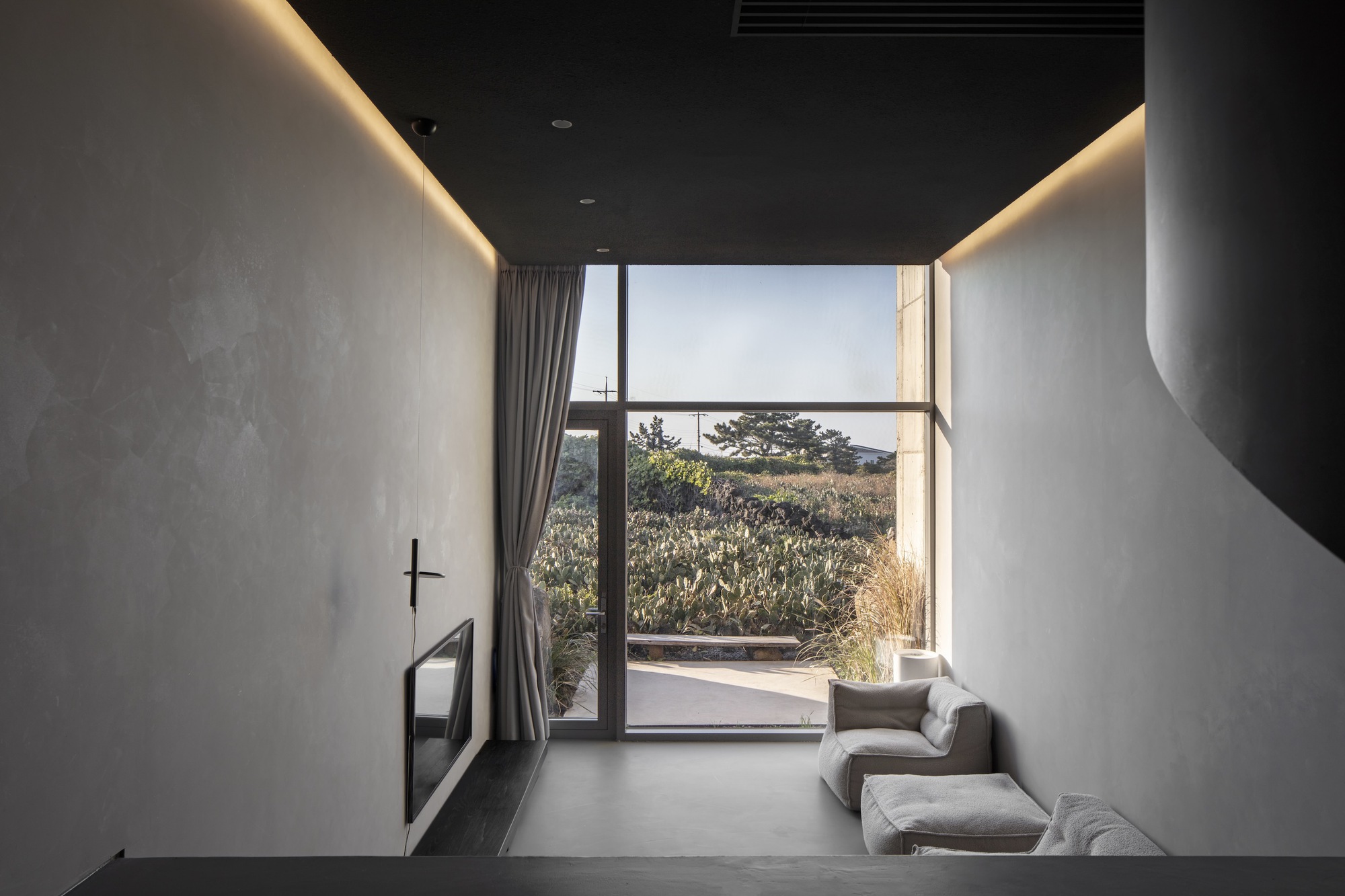 Gallery of Jeju Wollyeong CAVE Villa / JYA-RCHITECTS - 7