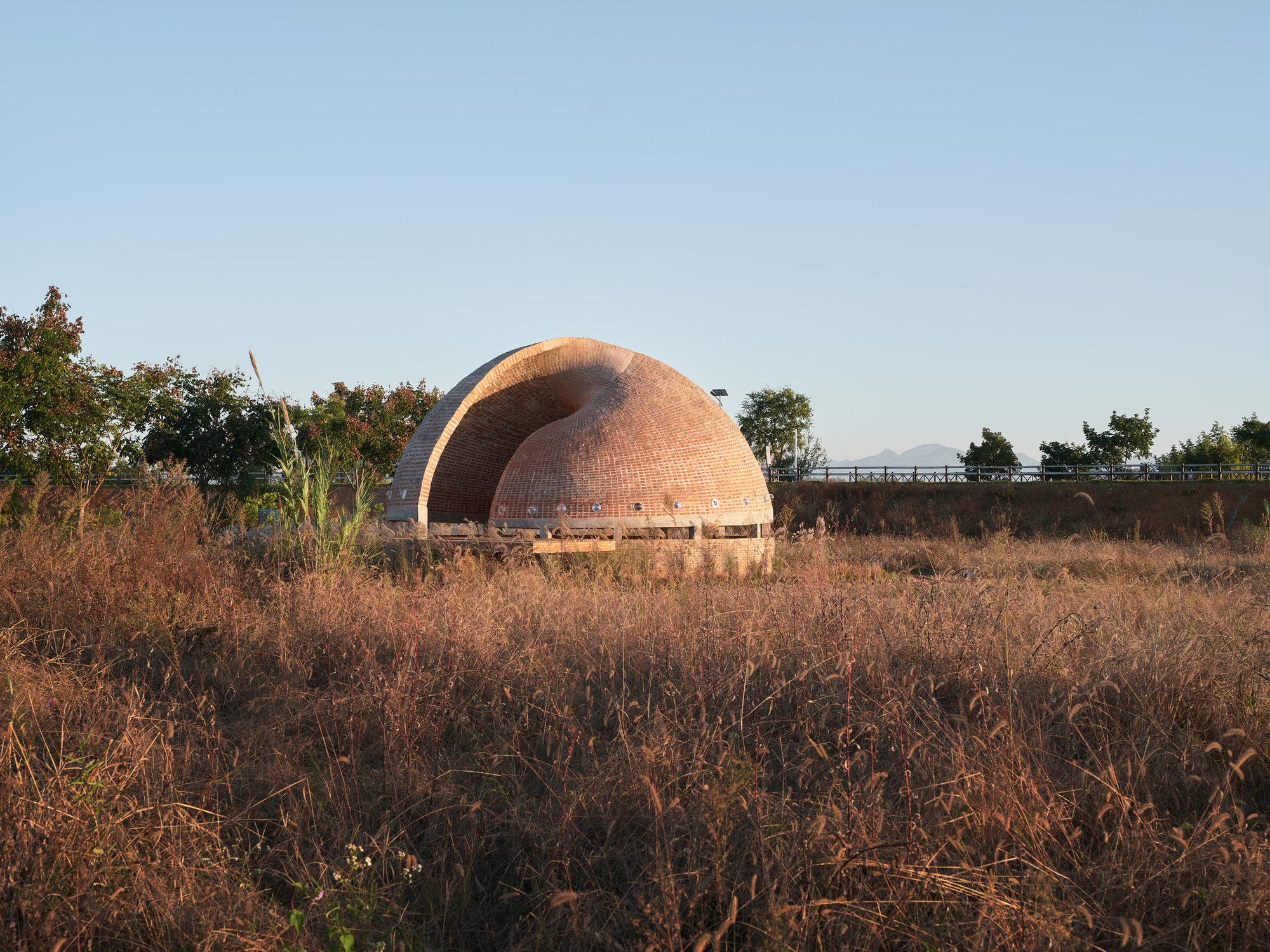 Gallery of Twisted Brick Shell Concept Library / HCCH Studio - 12