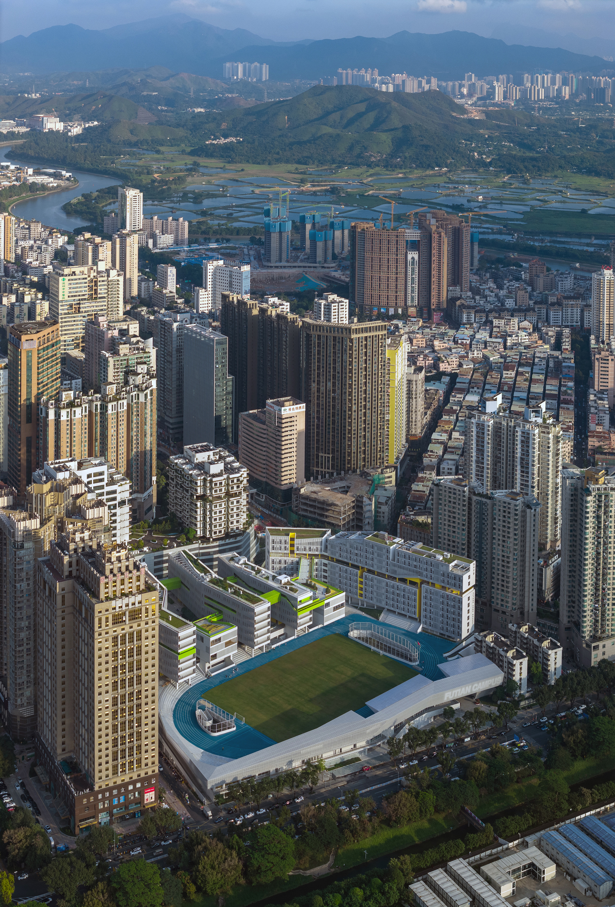 Gallery of FUTIAN High-School Campus / reMIX studio - 8