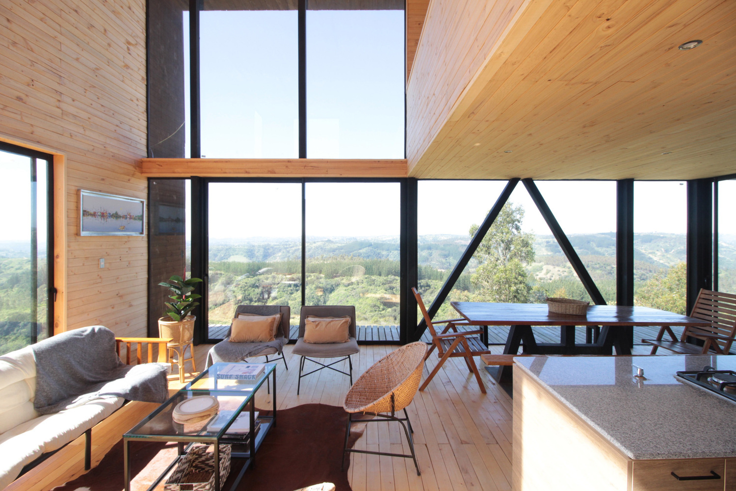 Galería de Honestidad material e integración al paisaje: 12 casas en ...