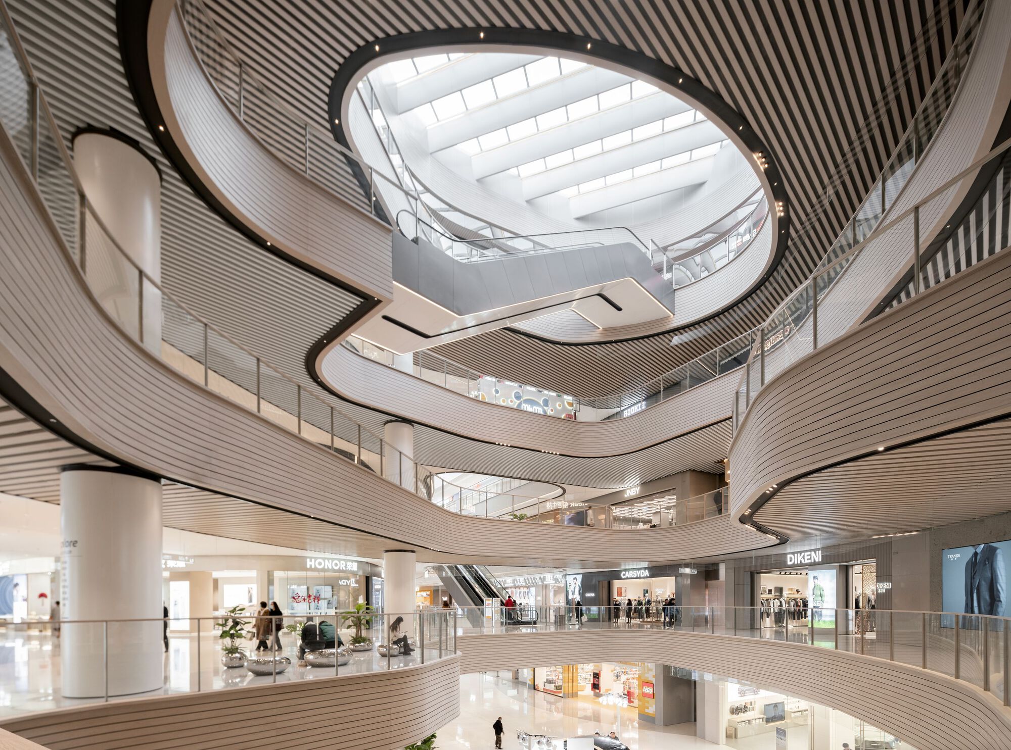 Gallery of Dalian Huanan MixC One Mall / Ippolito Fleitz Group - 12