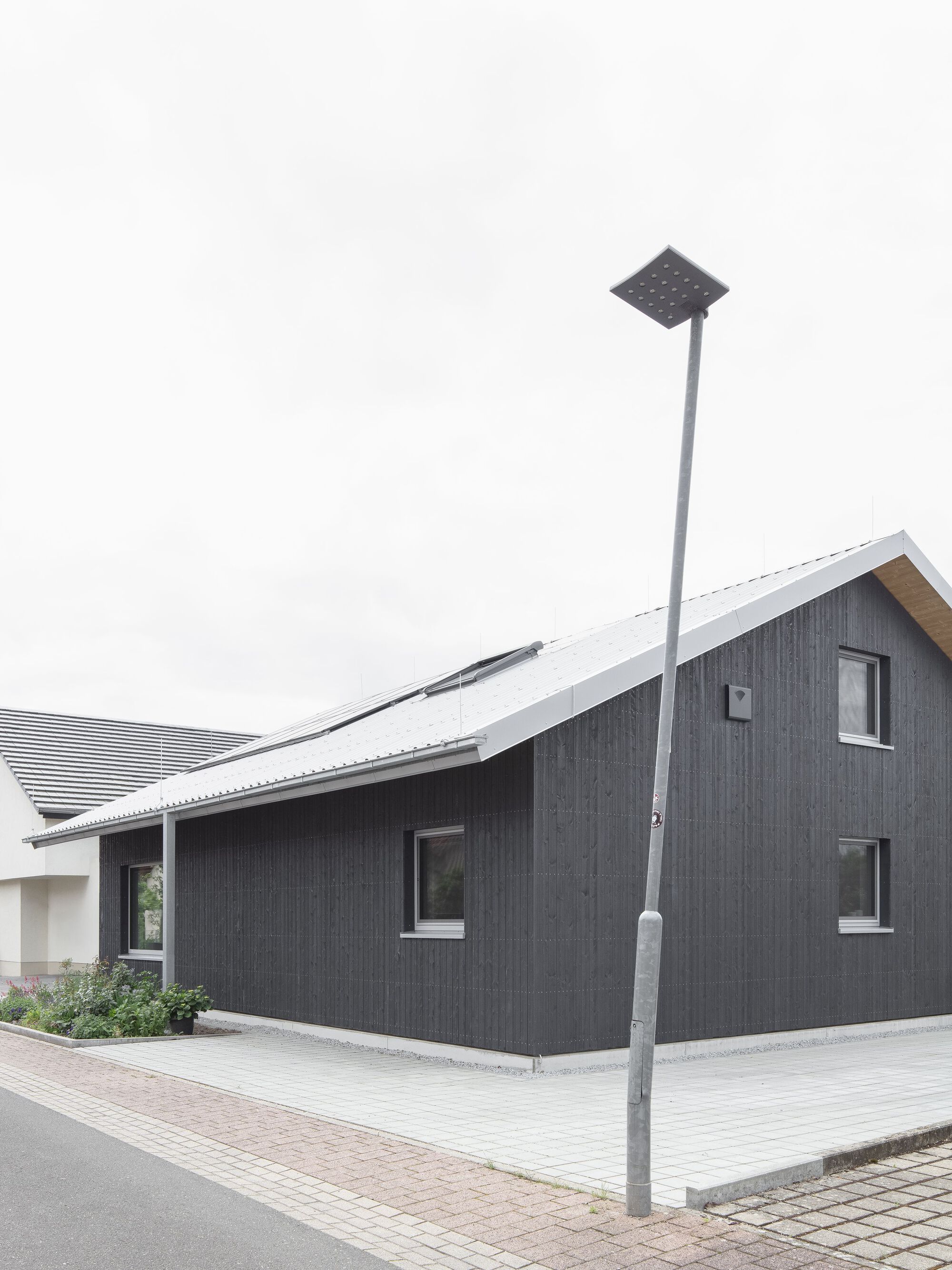 Gallery of Roofed Square and a Circle Single Family House / Curious ...