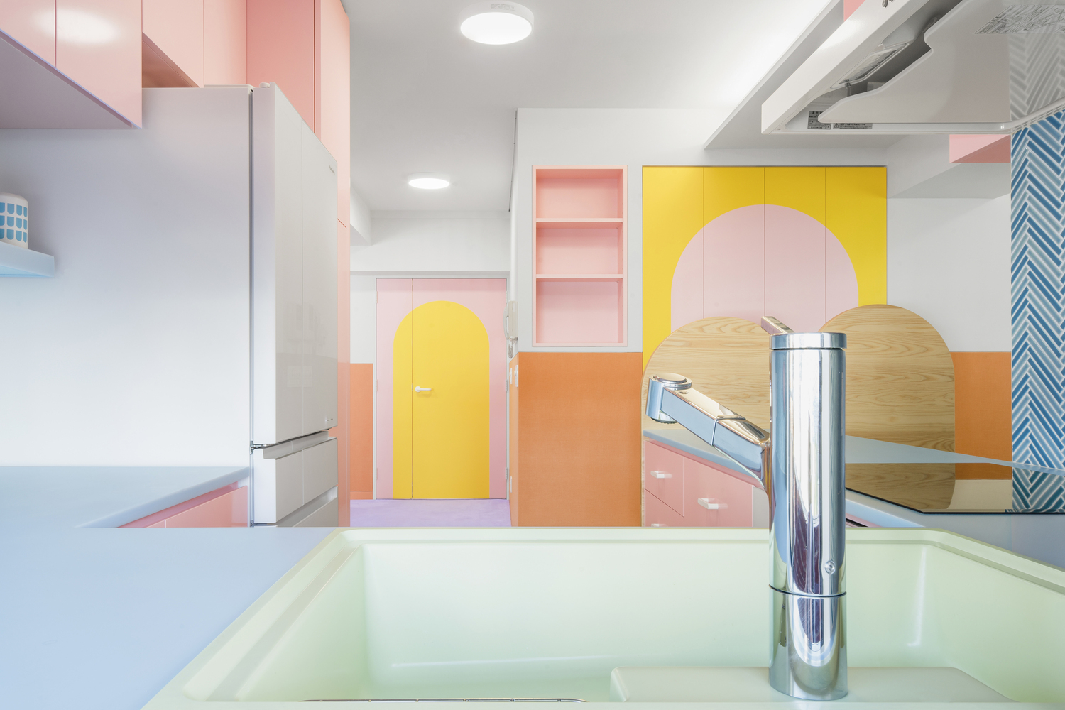 Vibrancy and Utility: Embracing Color in Urban Apartment Kitchens ...