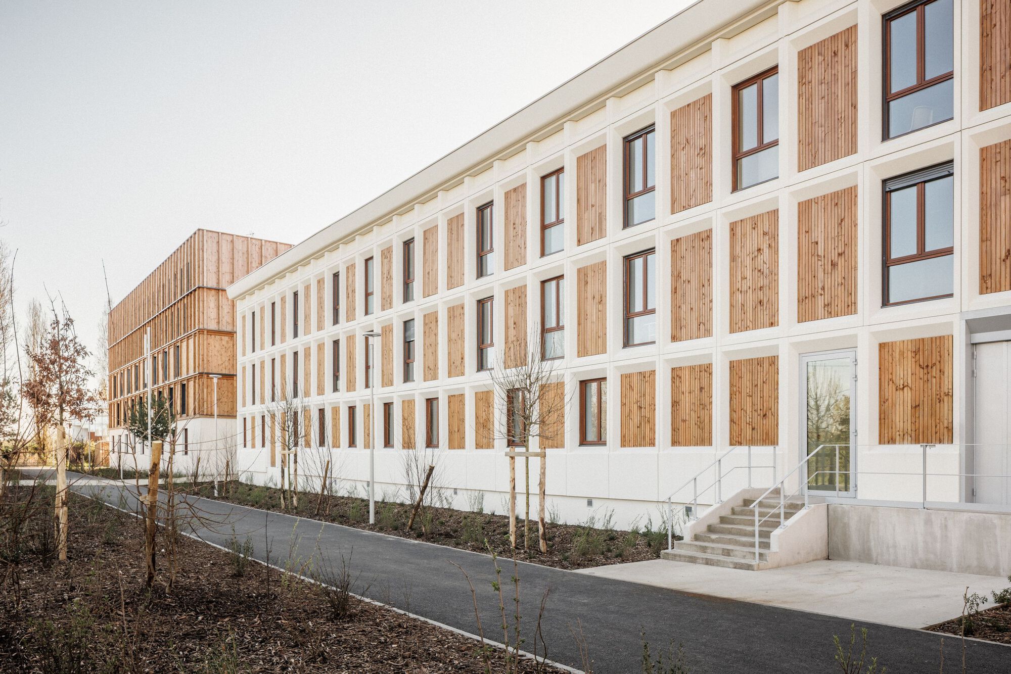 Gallery of Training Center Residence and Workshops for Apprentices ...