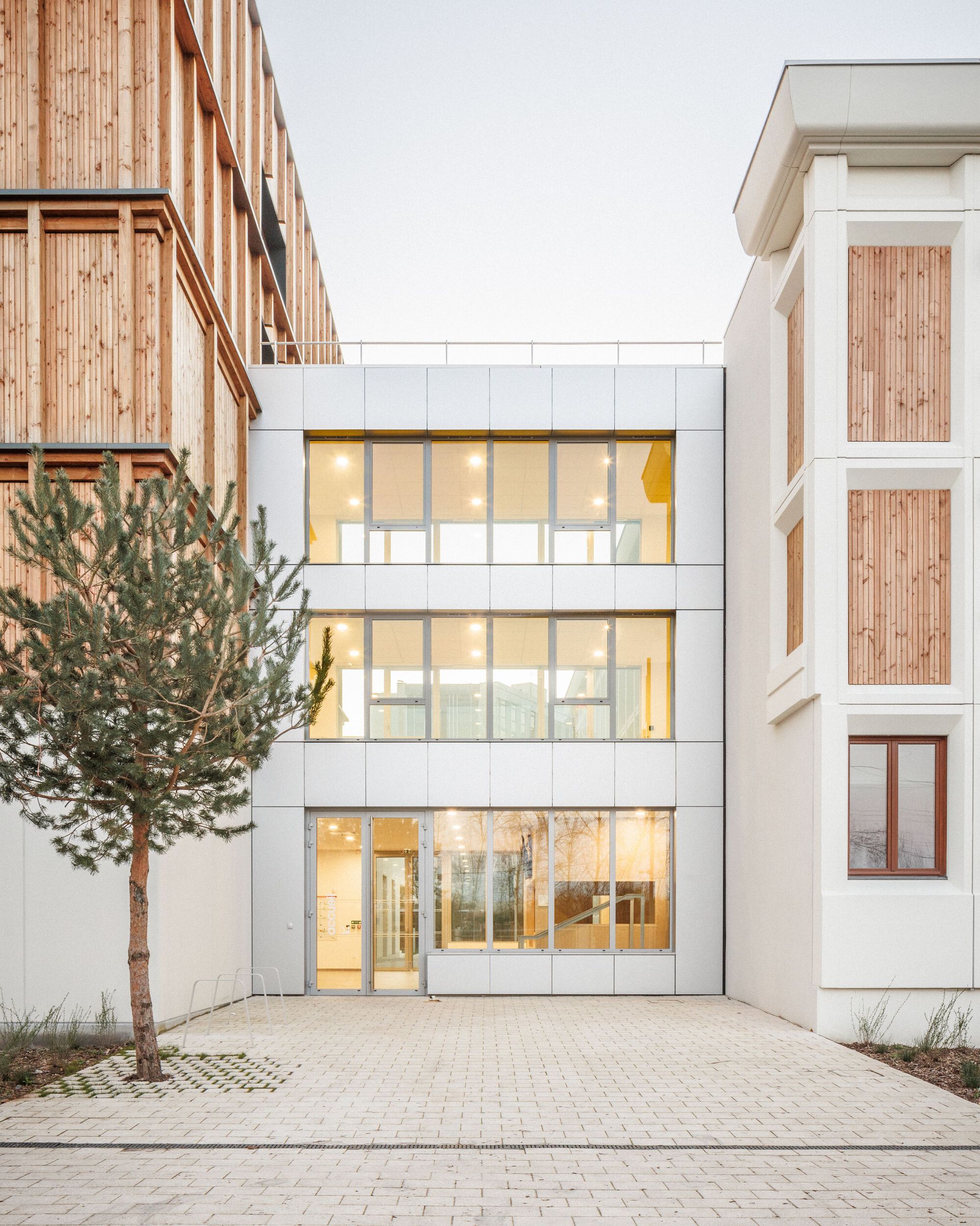Gallery of Training Center Residence and Workshops for Apprentices ...