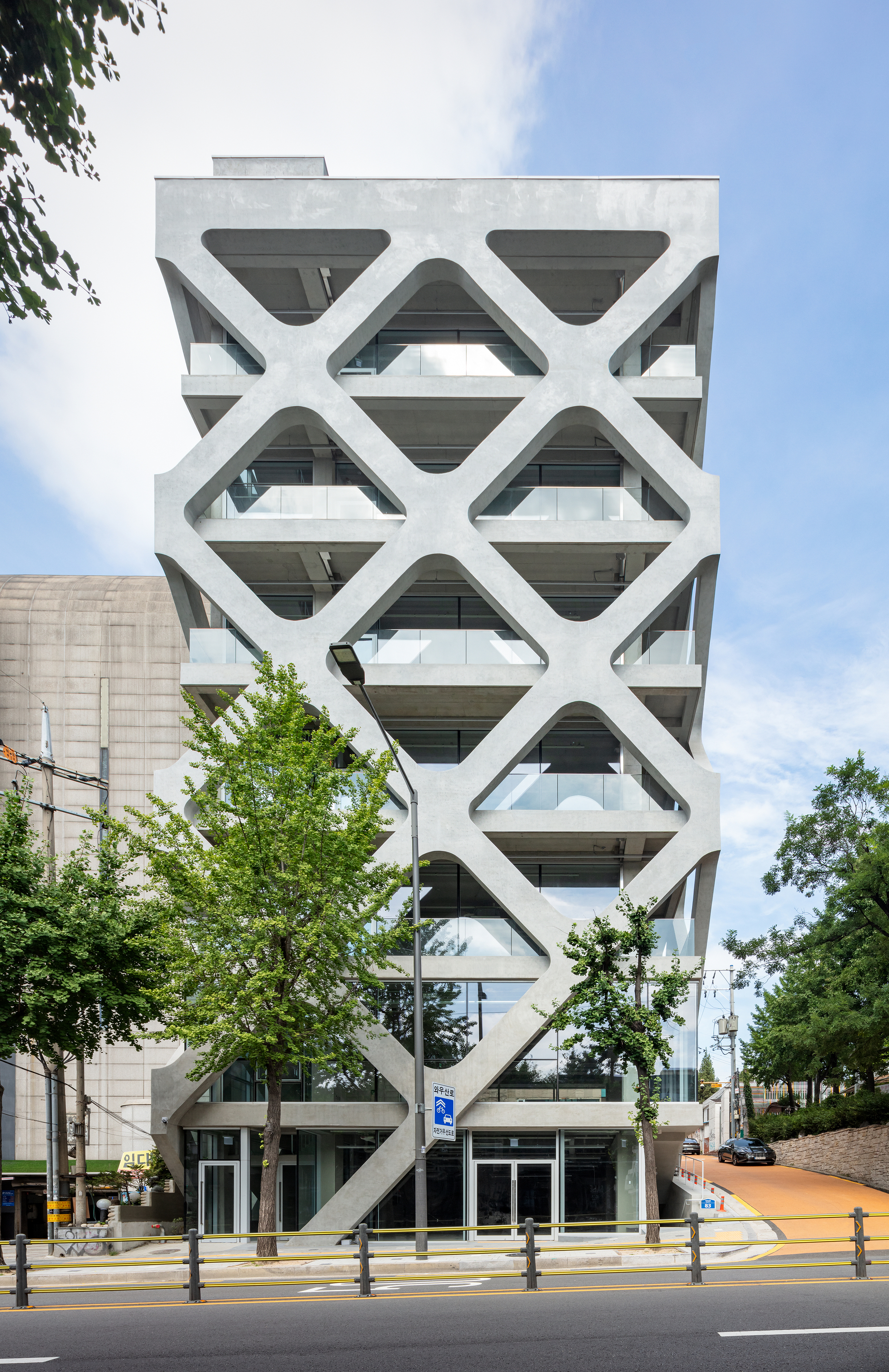 Gallery of Folded Ground Neighborhood Facility / LIFE Architects - 9
