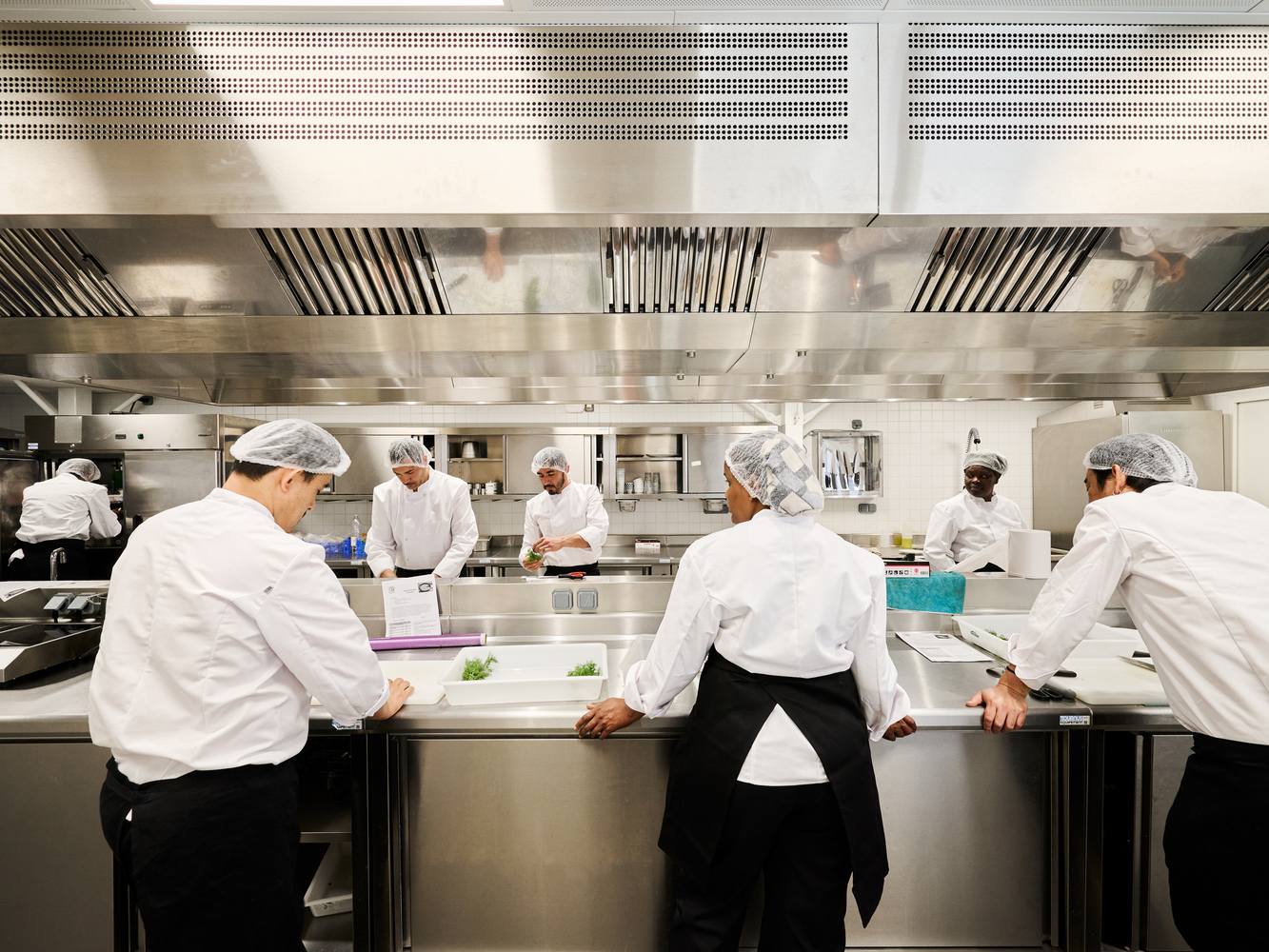 Gallery of Cooking School for Migrants of Renovation Industrial Hall ...