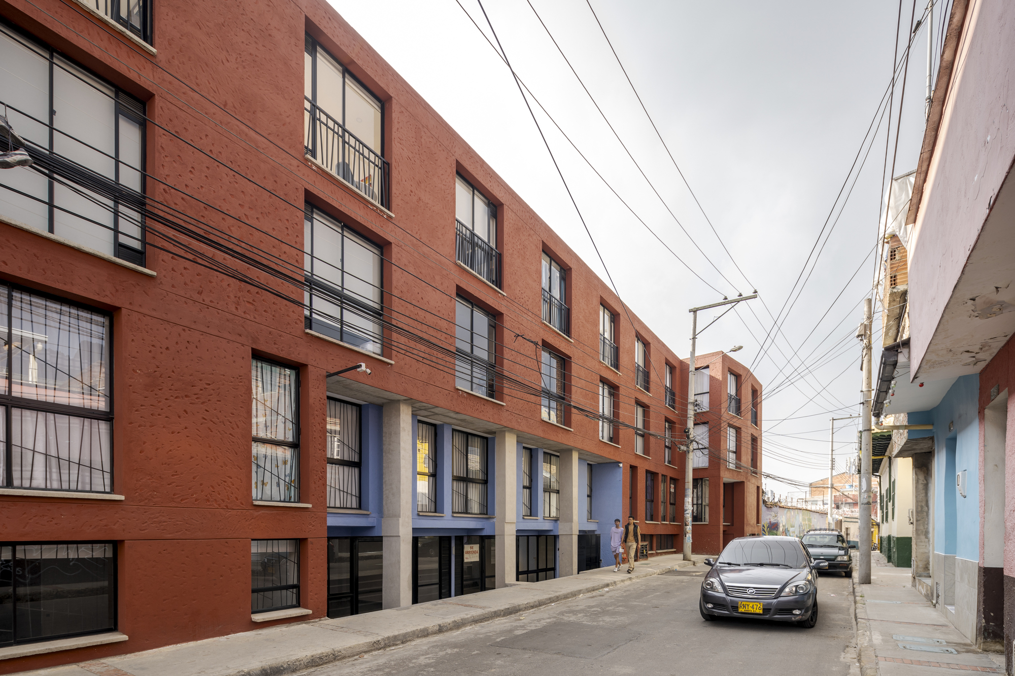 Gallery of Monfort Suites Royal Multi-family Housing Complex / Concreta ...