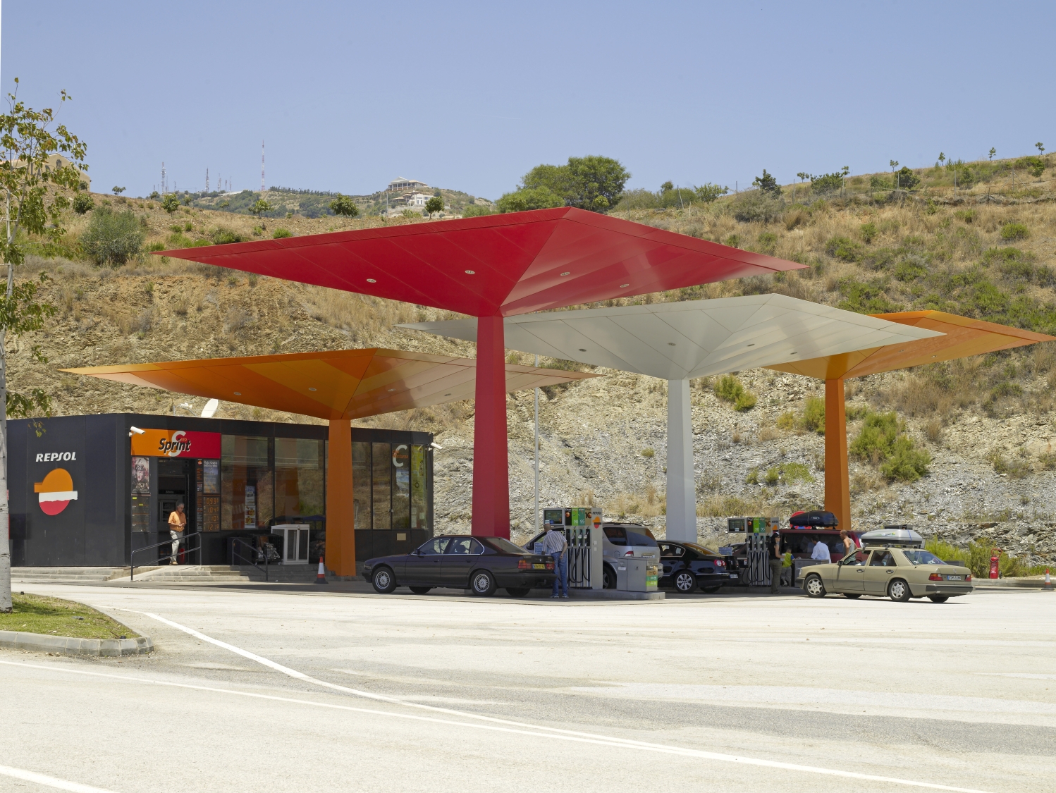 Gallery of The Evolution of Gas Stations: From Roadside Stops to ...