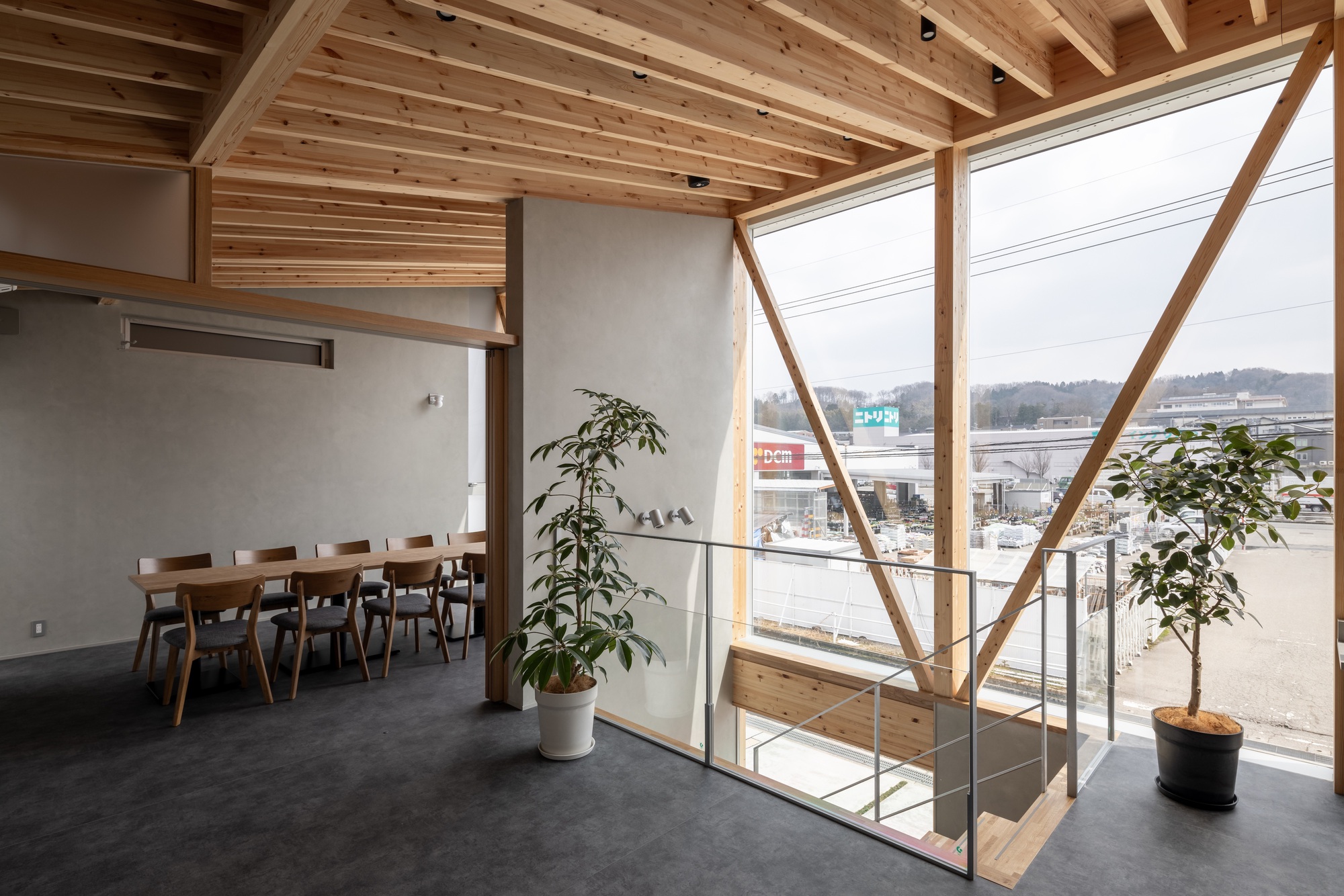 Gallery of Café with a Large Tree in the Middle of Town / Kazuto Nishi ...