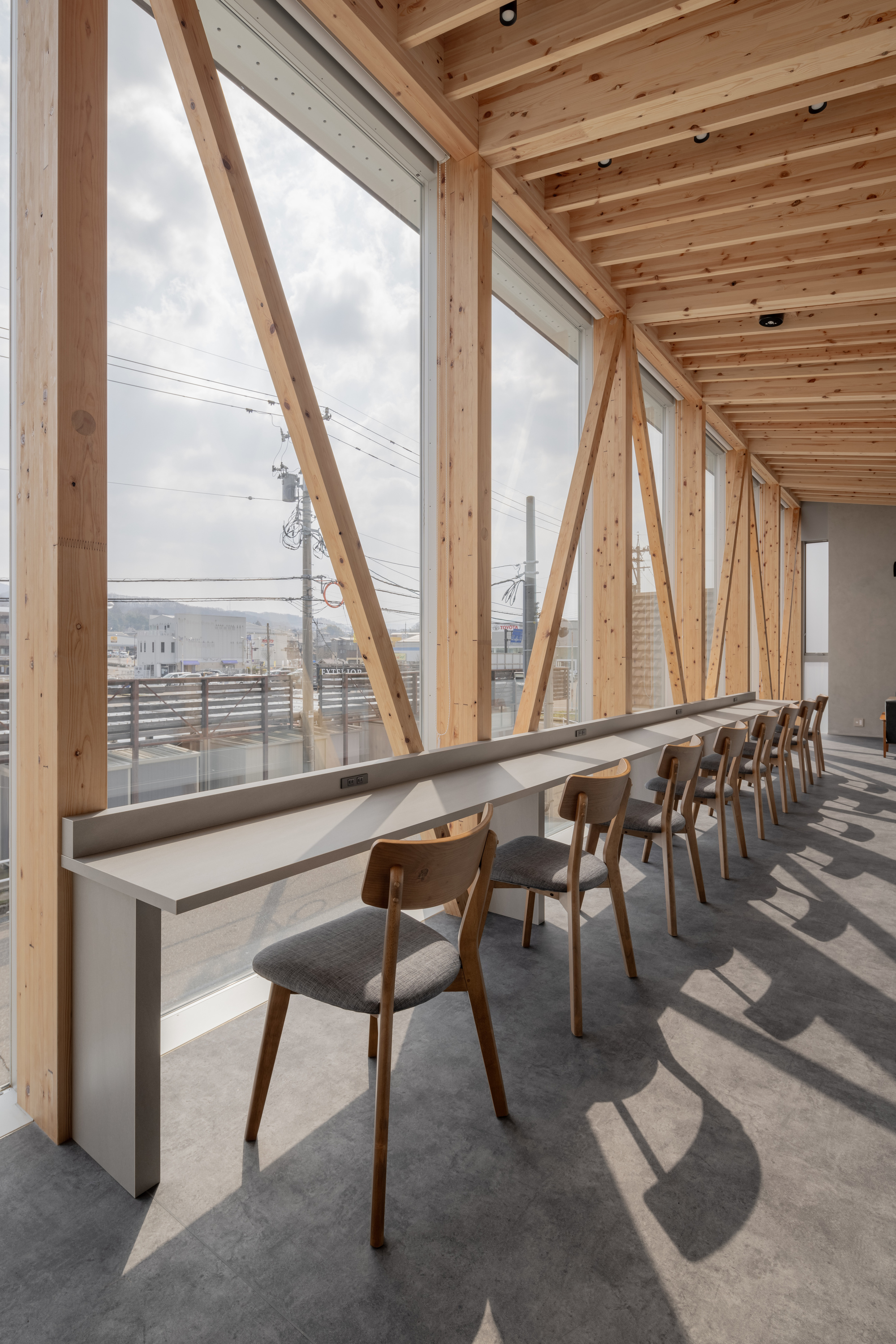 Gallery of Café with a Large Tree in the Middle of Town / Kazuto Nishi ...
