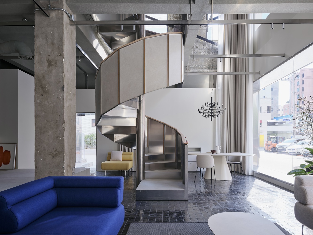 Gallery of Exploring Showroom Interiors: The Art of Displaying Materials, Furniture, and Design ...