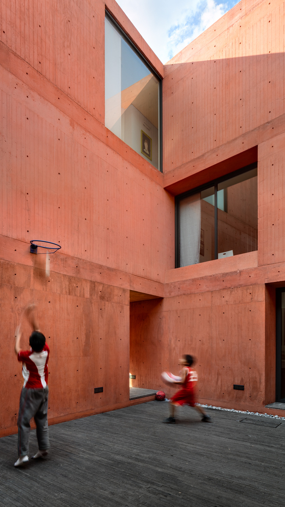 Gallery of More Than Gray: 15 Projects That Explore Red Pigmented ...
