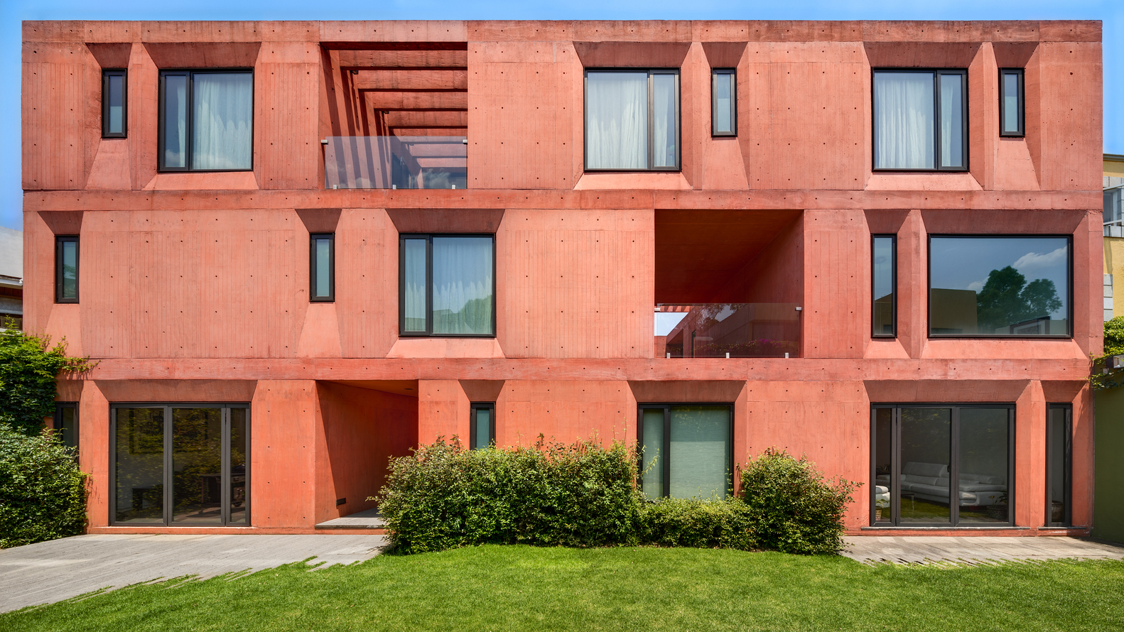 Gallery of More Than Gray: 15 Projects That Explore Red Pigmented ...