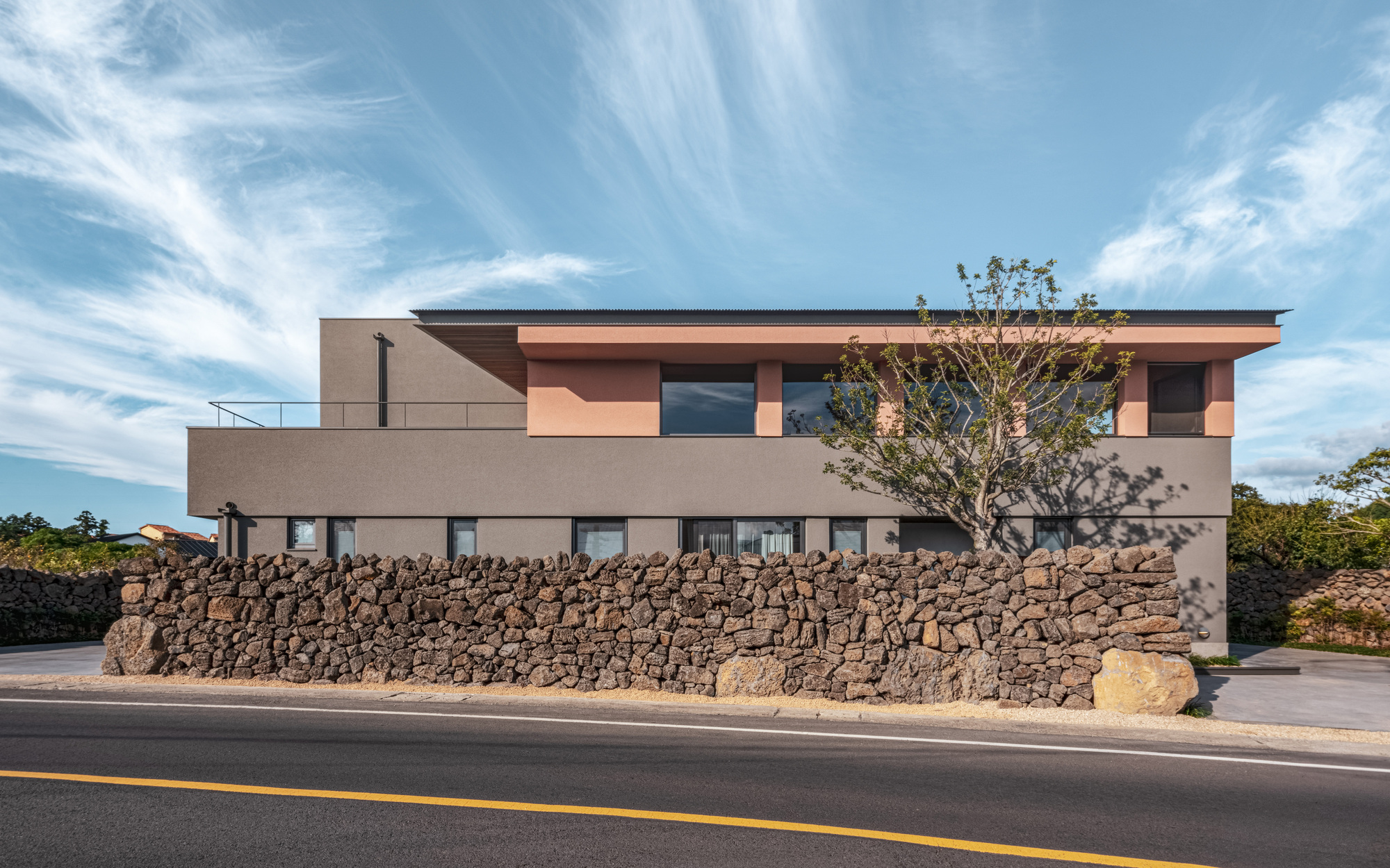 Gallery of Stone Wall Stay House / Atelier O - 12