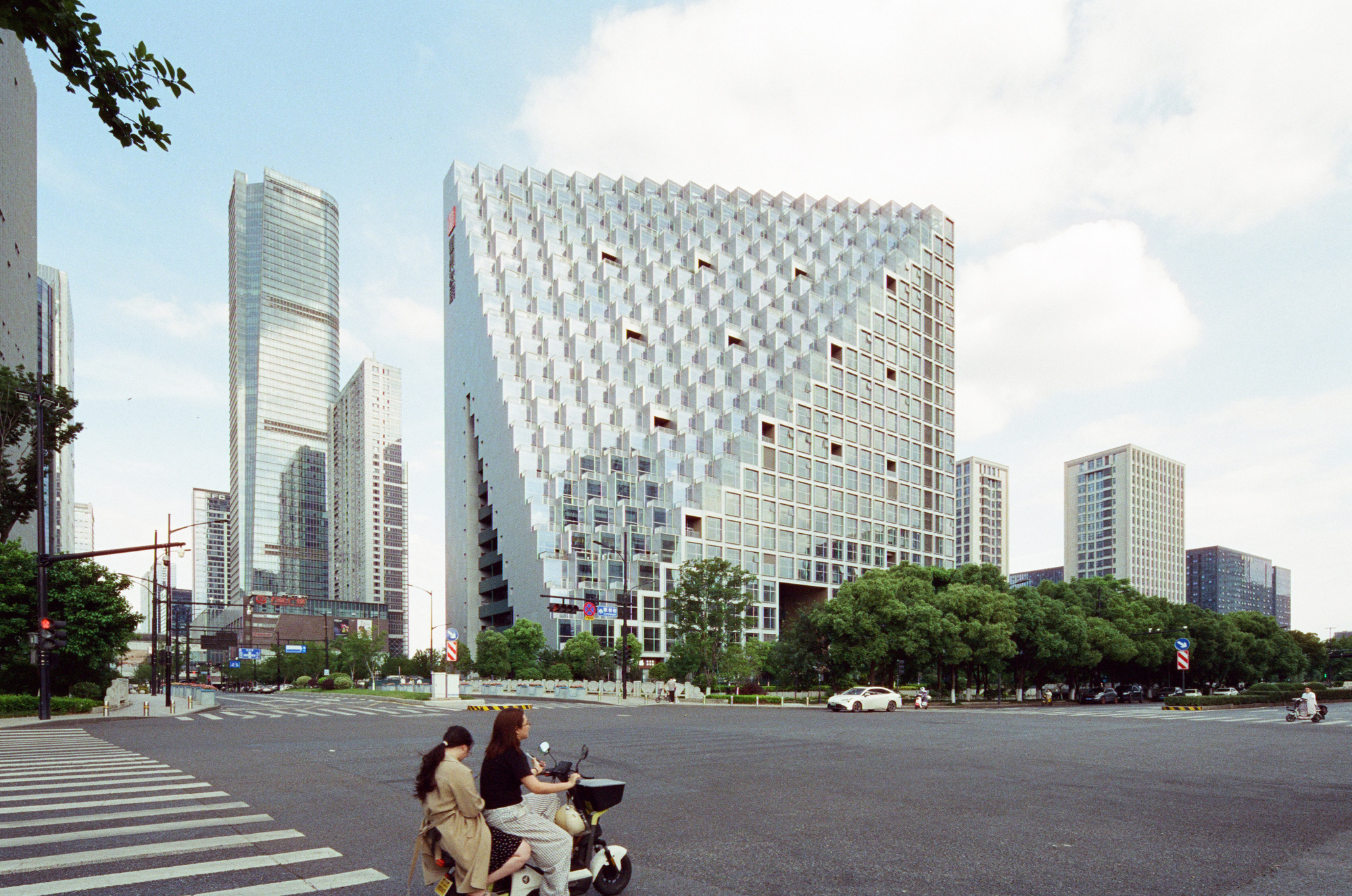 Gallery of OMA Completes Hangzhou Prism Mixed-Use Development in China ...